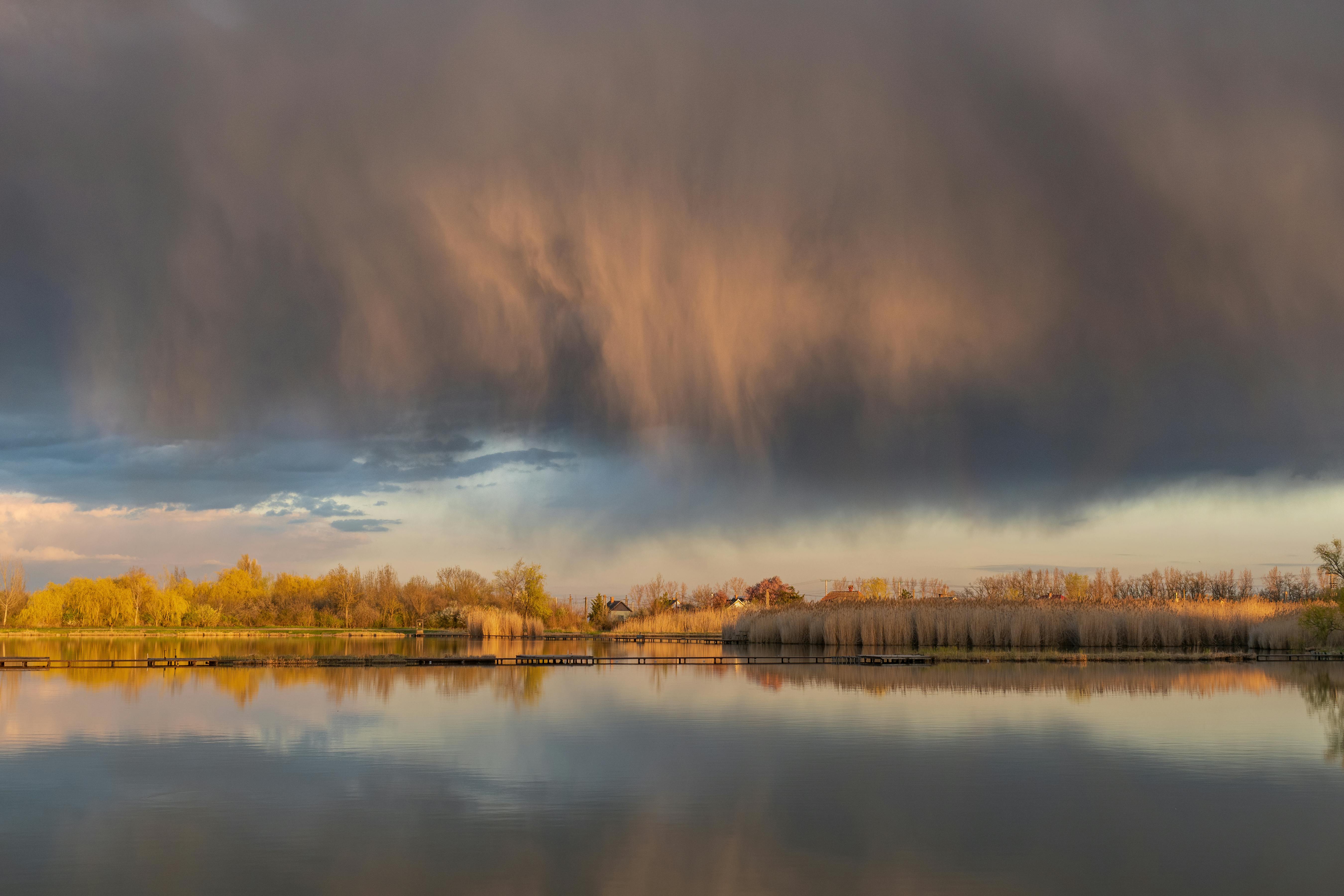 A Storm Cloud Above a Lake · Free Stock Photo