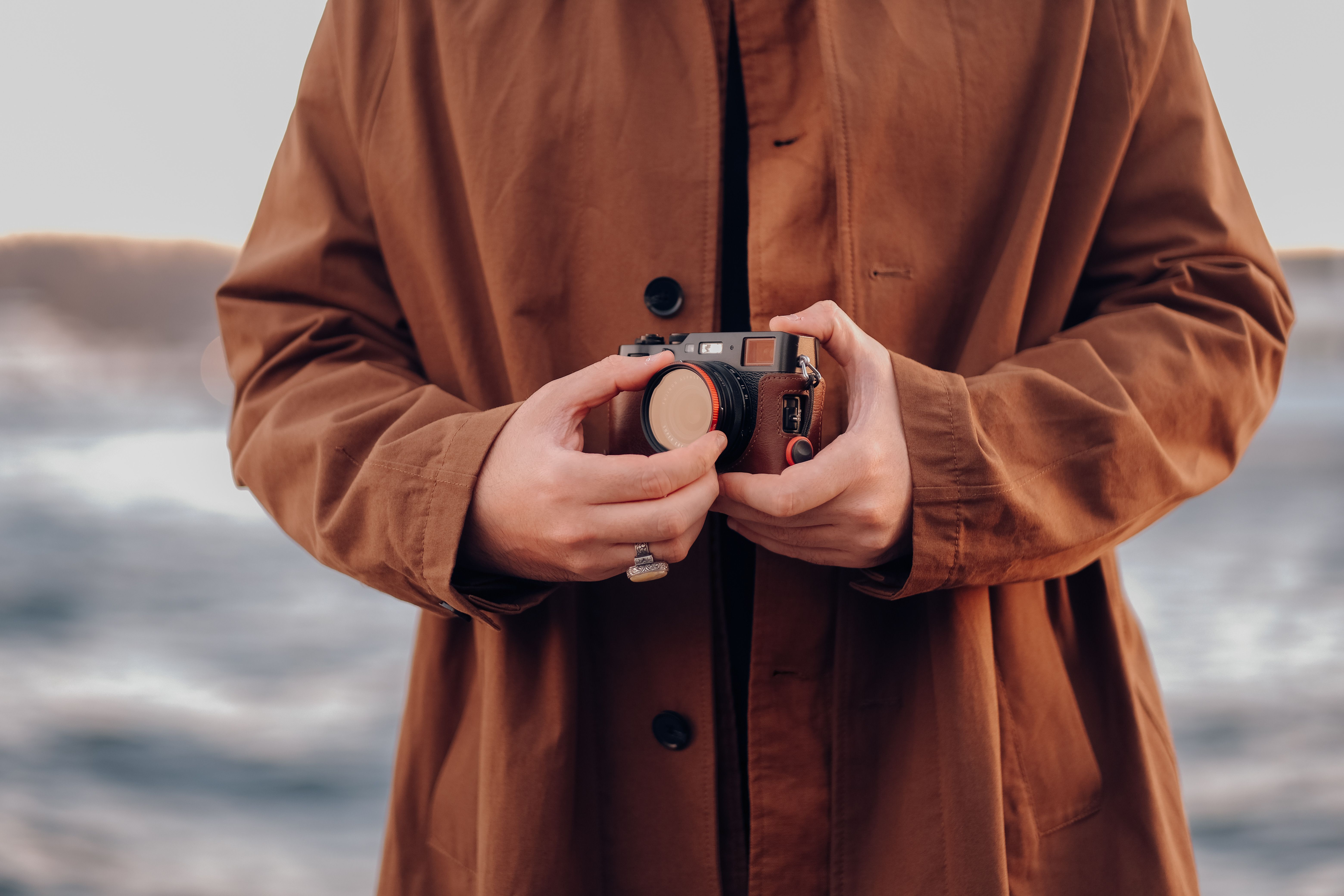 Man Buttoning his Shirt Cuffs · Free Stock Photo