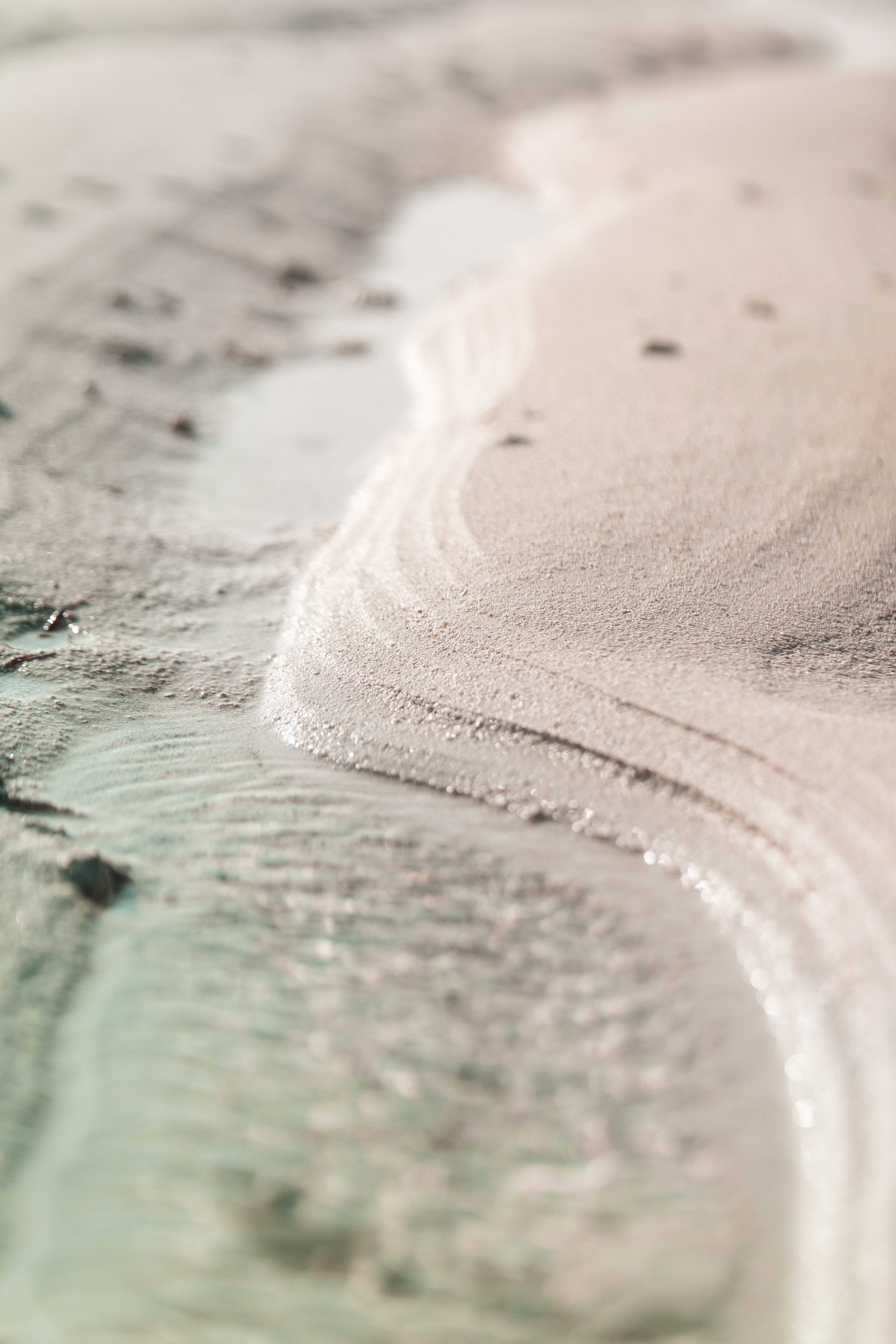 Close-Up Shot of Beach Sand · Free Stock Photo
