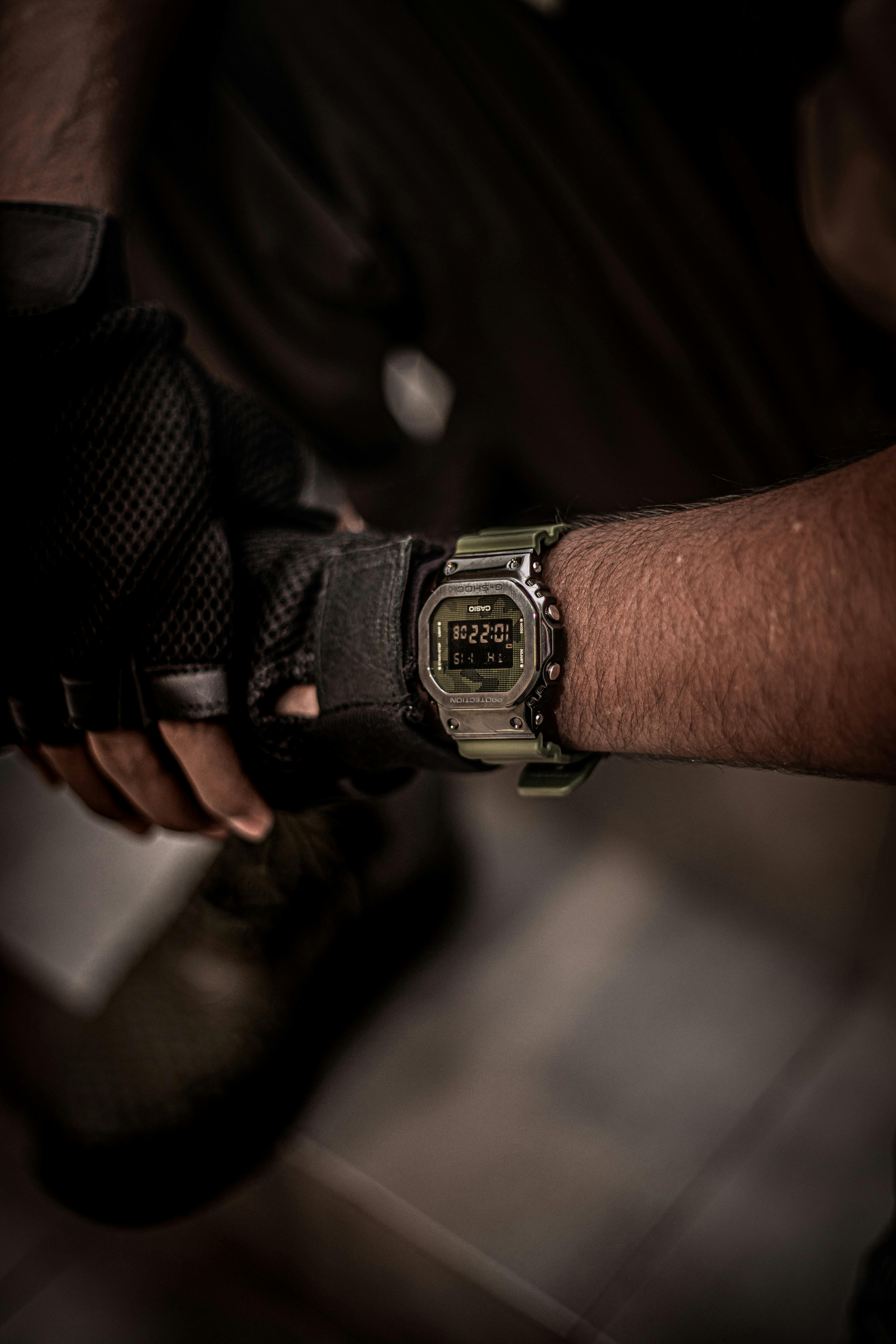 Close Up Photo of Man Wearing Green Digital Wrist Watch · Free Stock Photo
