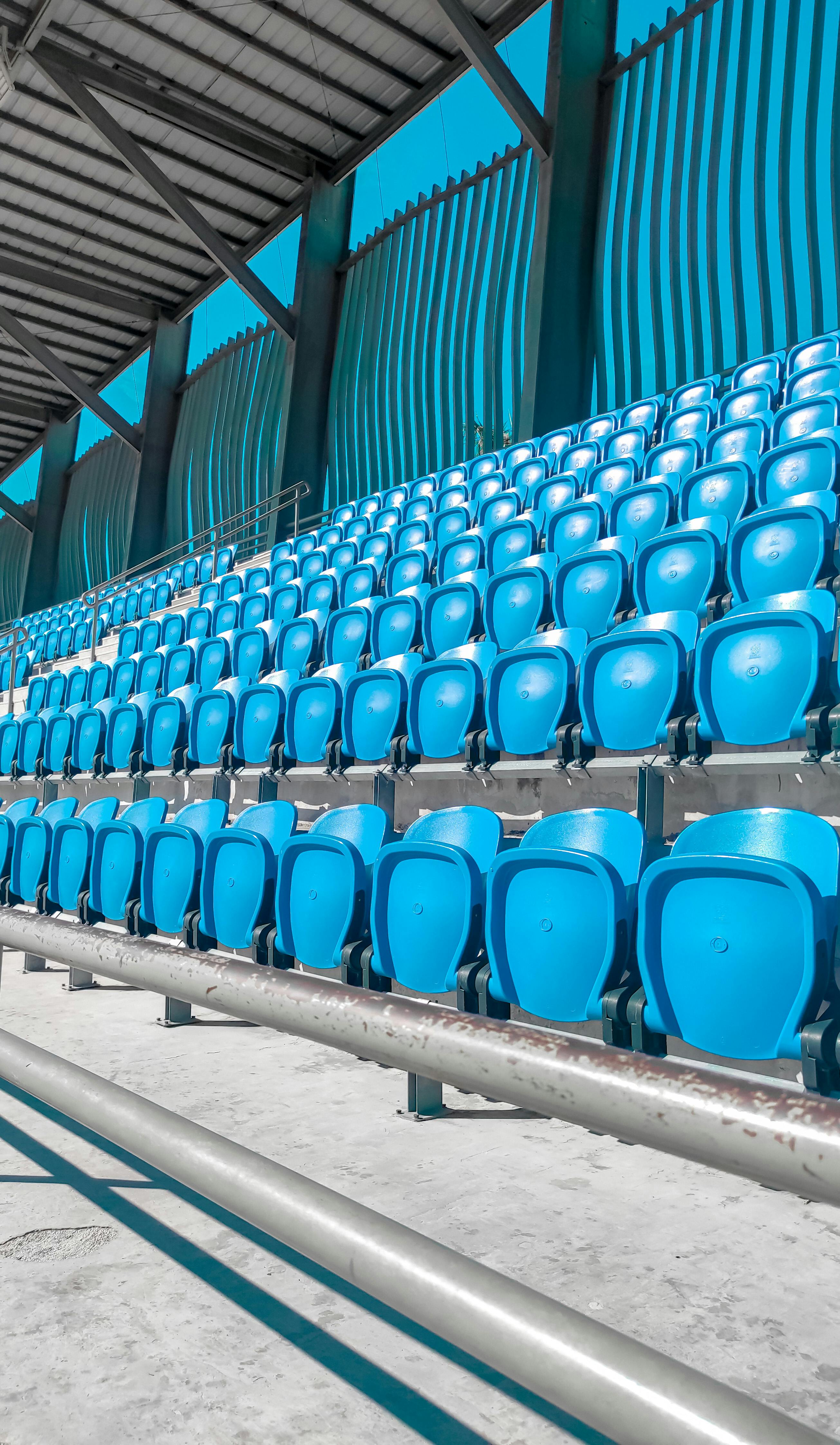 Photo of Blue Bleachers in a Stadium · Free Stock Photo