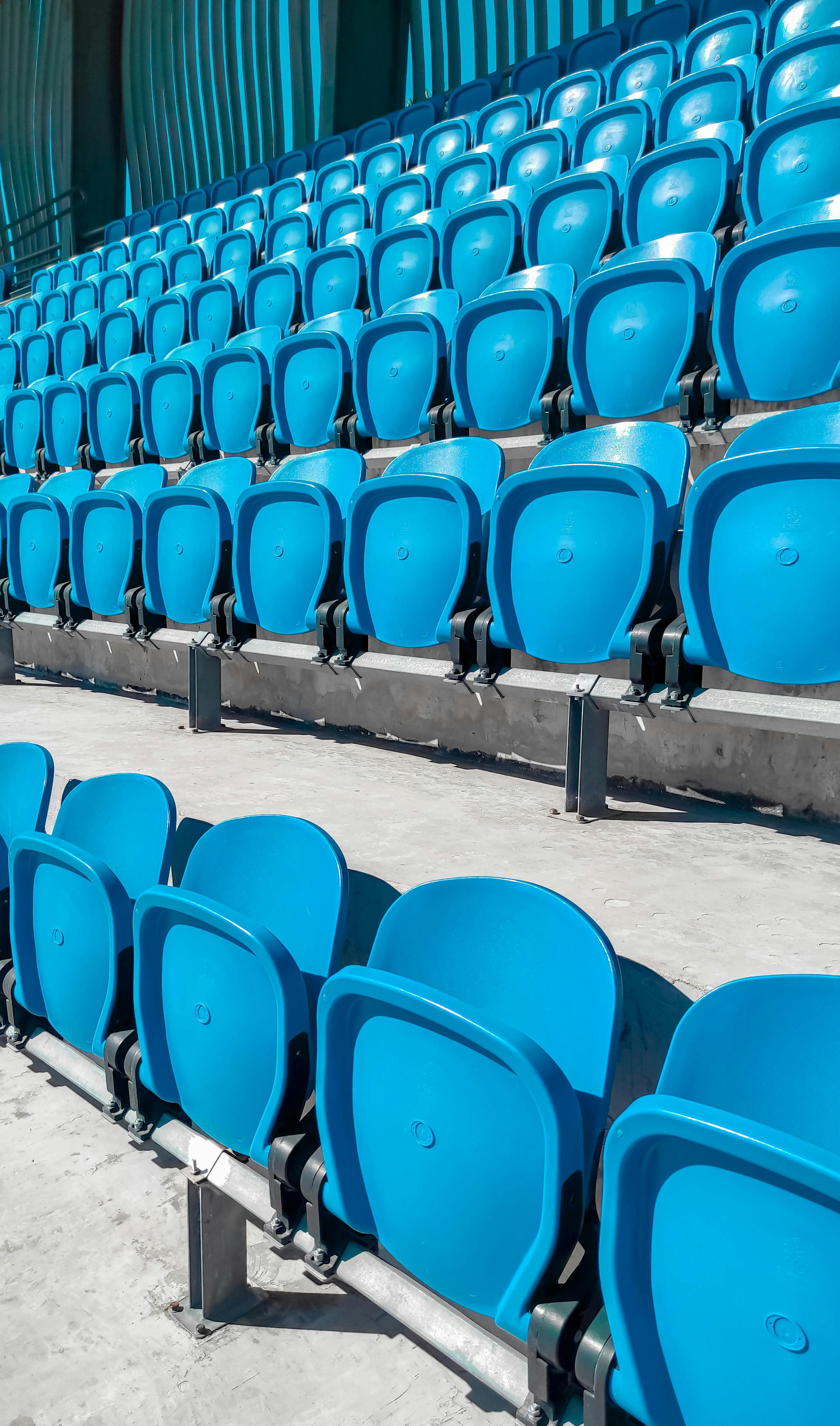 Red and Black Stadium Seats · Free Stock Photo