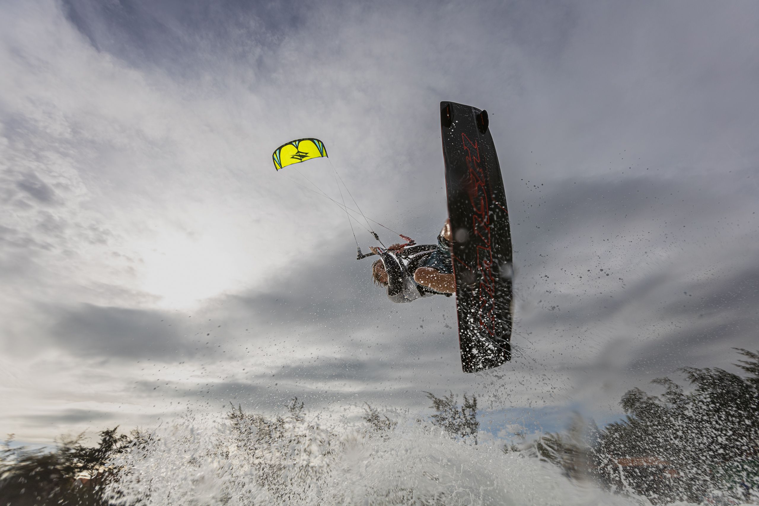 Person Kitesurfing on Body of Water · Free Stock Photo