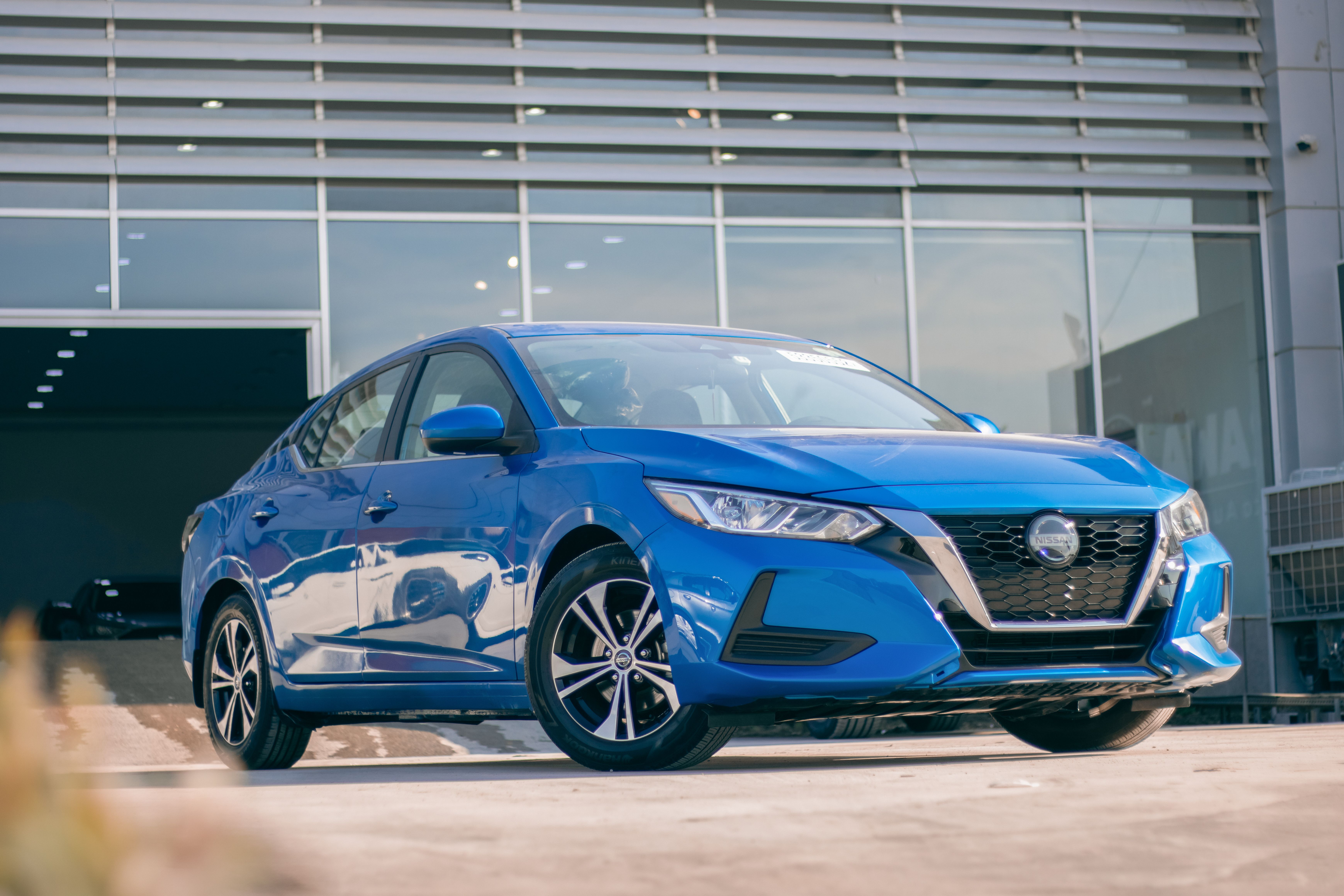 Photograph of a Blue Nissan Sentra Car · Free Stock Photo