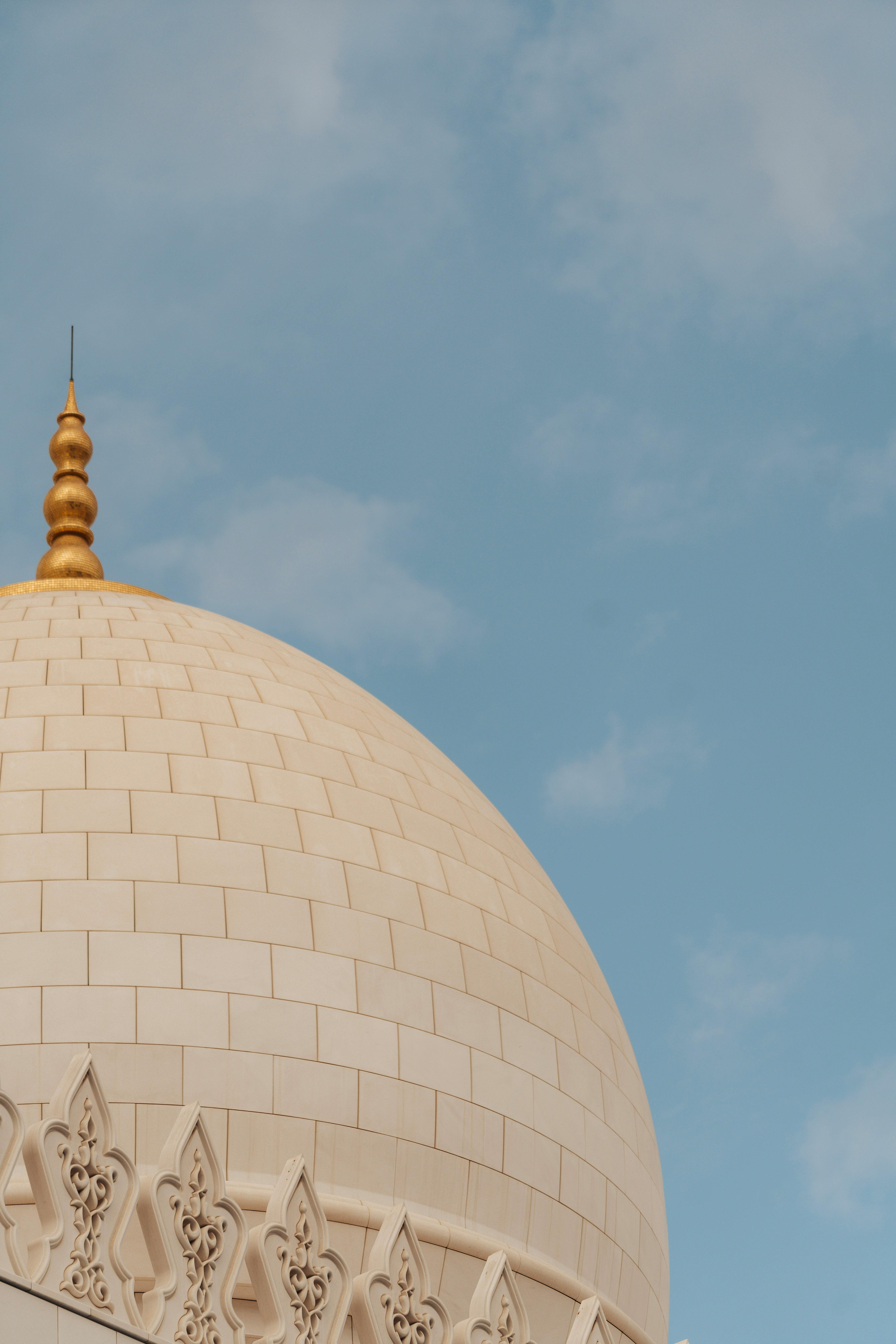 Stone Mosque Dome against Blue Sky · Free Stock Photo