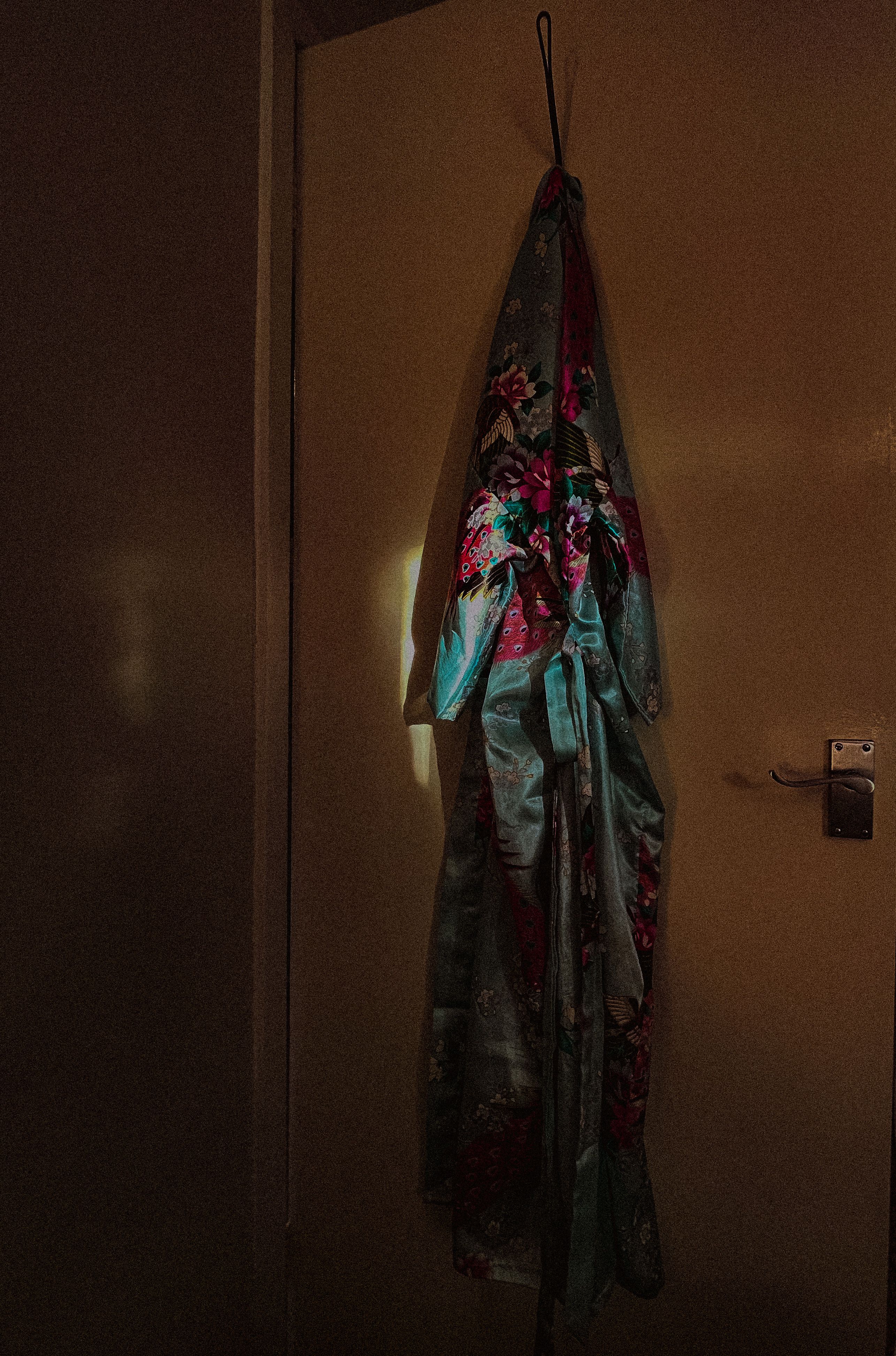 A Silk Cloth Hanging on the Door · Free Stock Photo