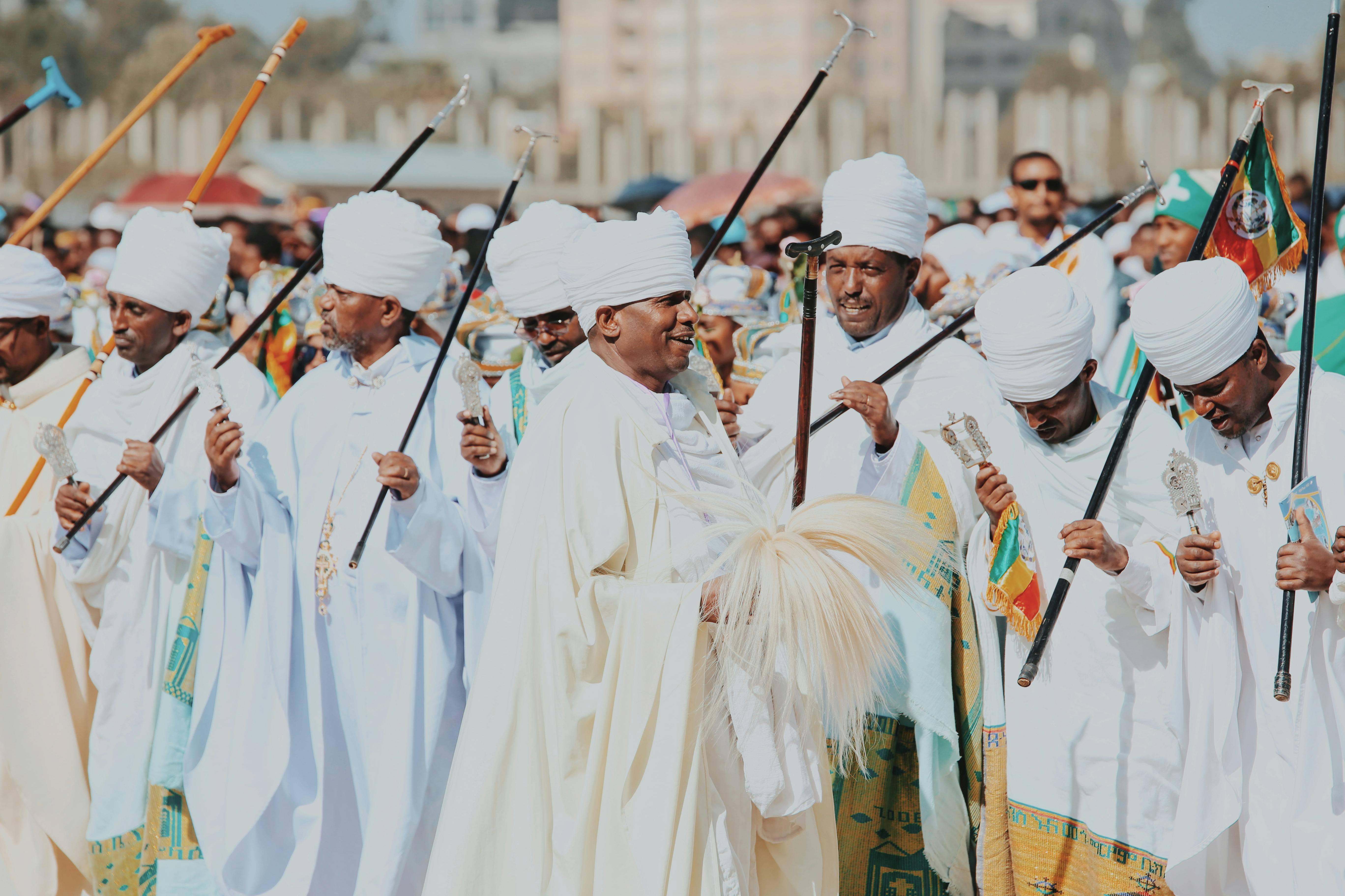 Men in Traditional Clothing on Ceremony · Free Stock Photo
