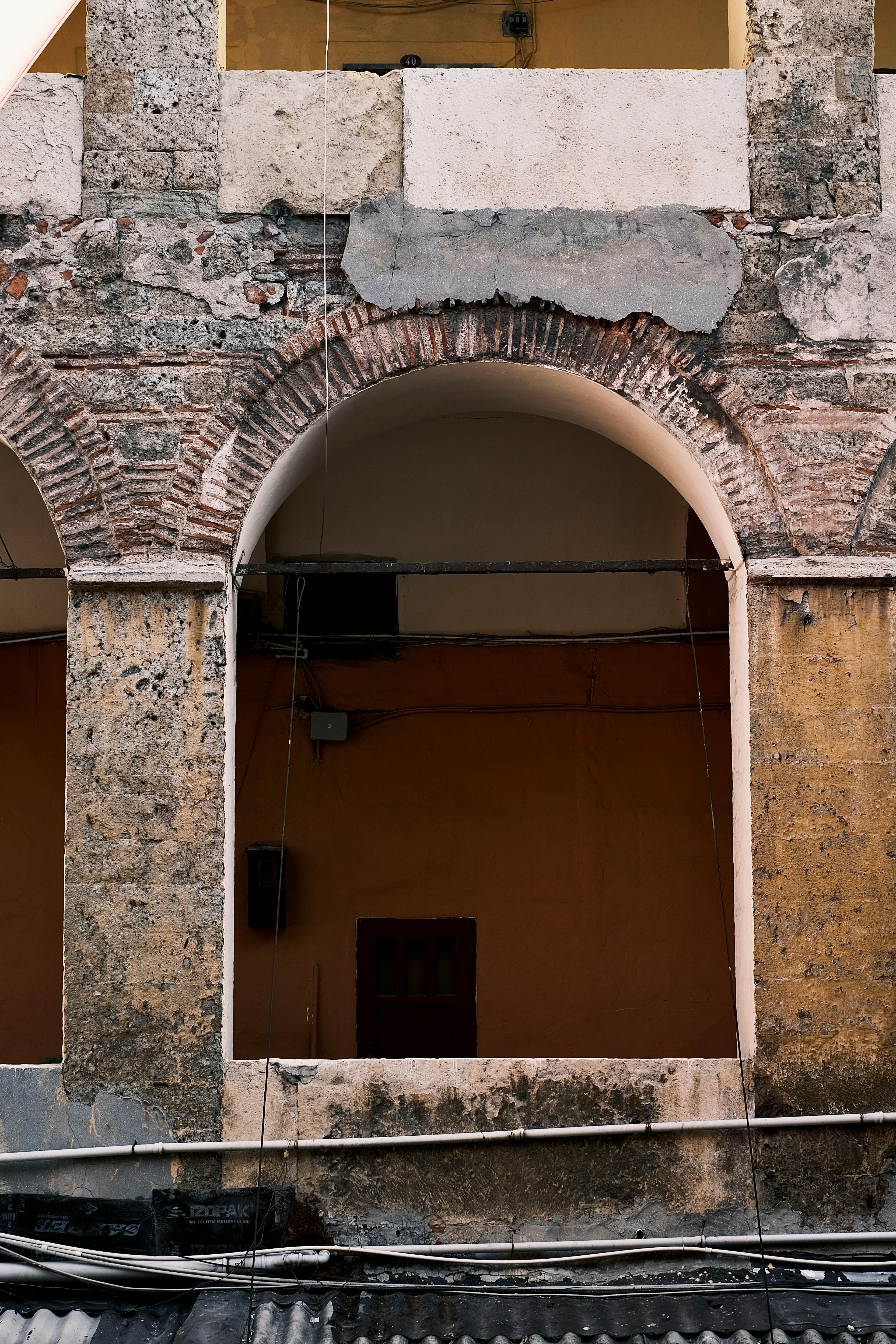Arch on Building Wall · Free Stock Photo