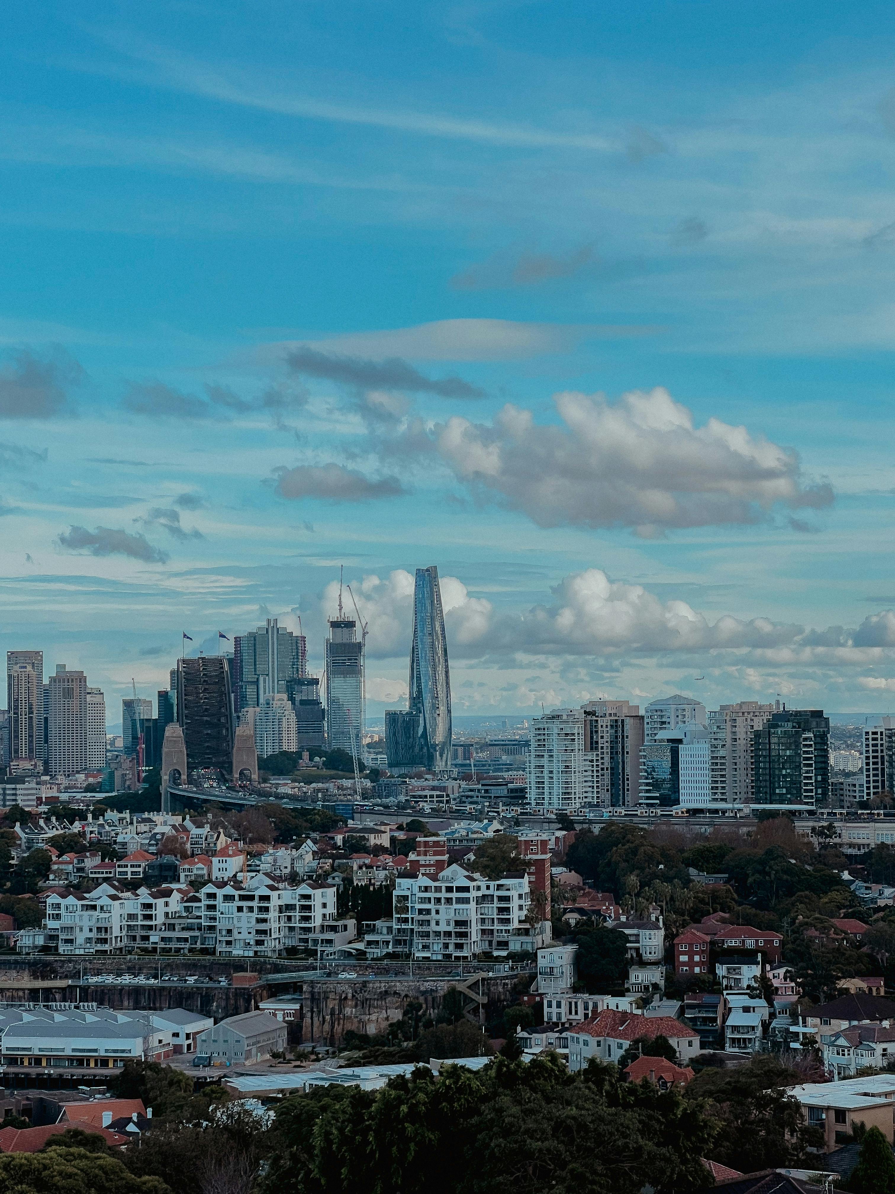 City Horizon Under Clear Skies · Free Stock Photo