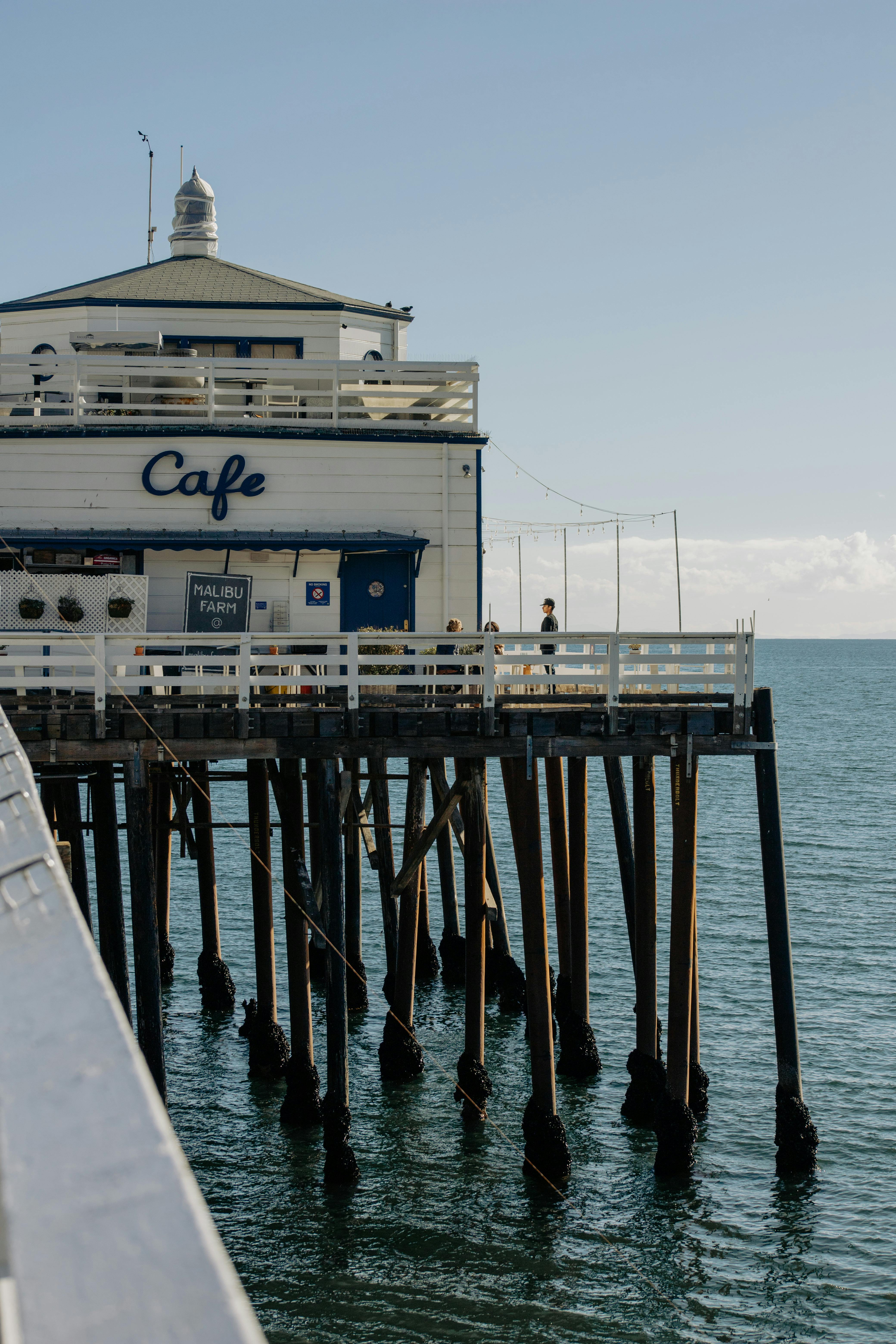 Pier with Cafe on Sea Shore · Free Stock Photo