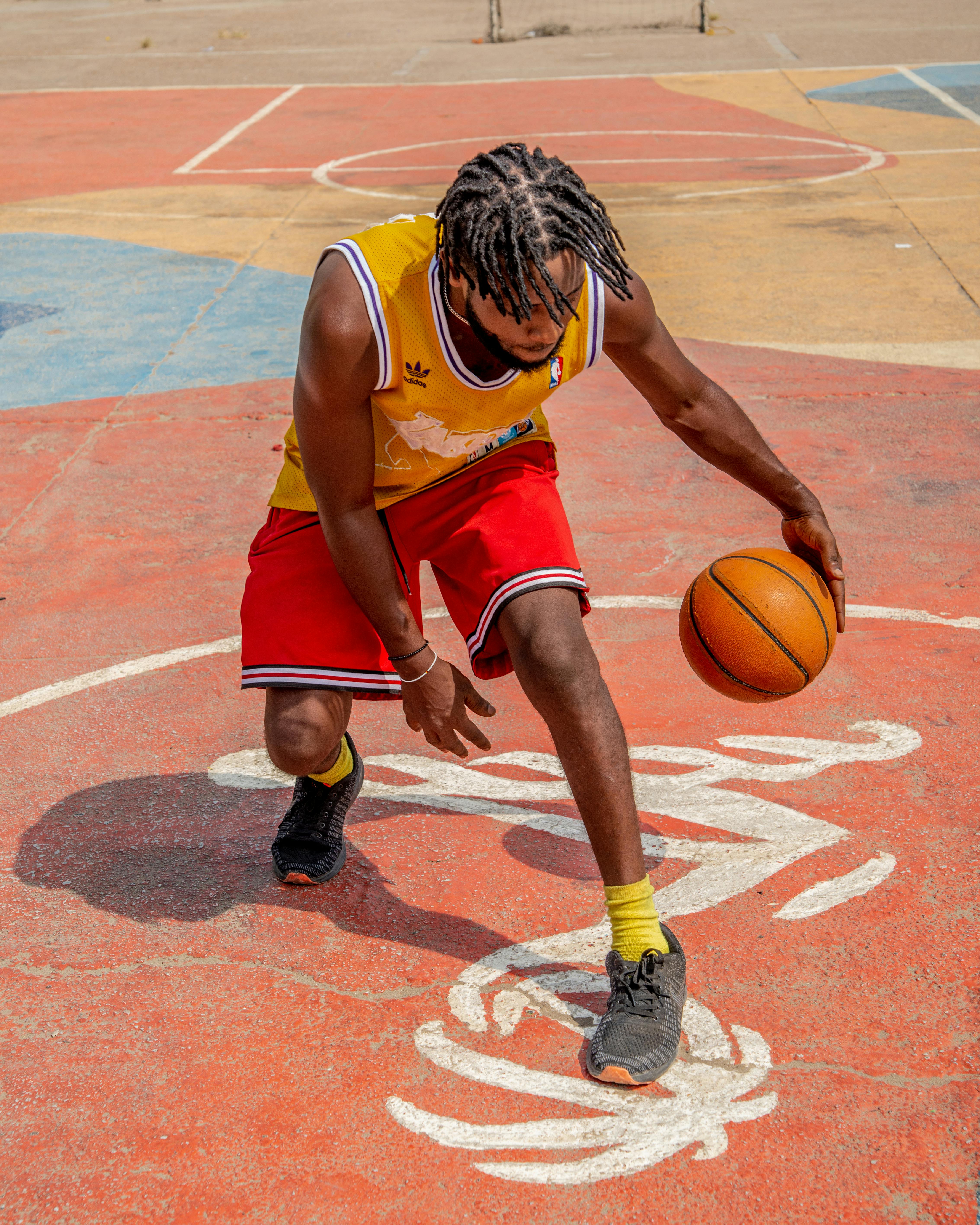 Man Playing Basketball on Basketball Court · Free Stock Photo