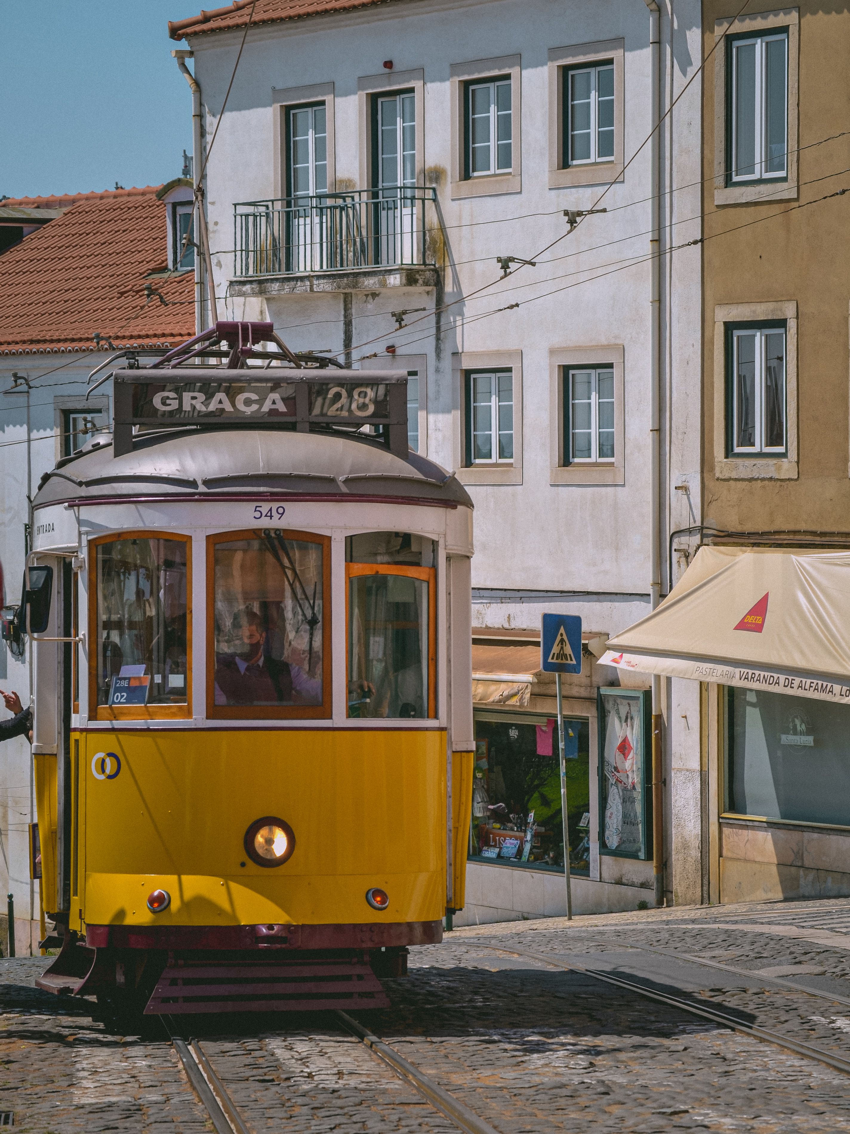 Yellow Tram in the Street of Lisbon · Free Stock Photo