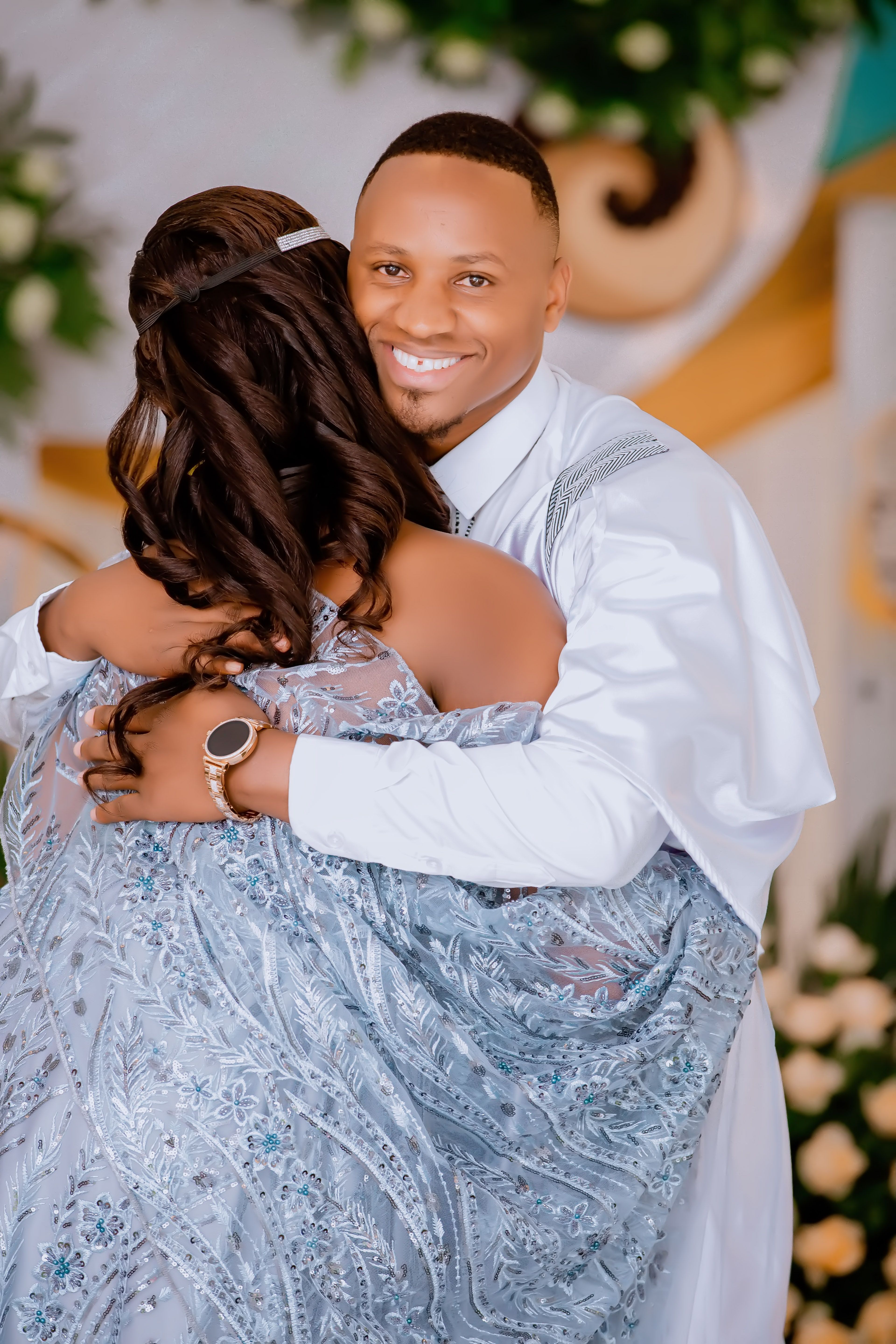 Couple Hugging by Building · Free Stock Photo