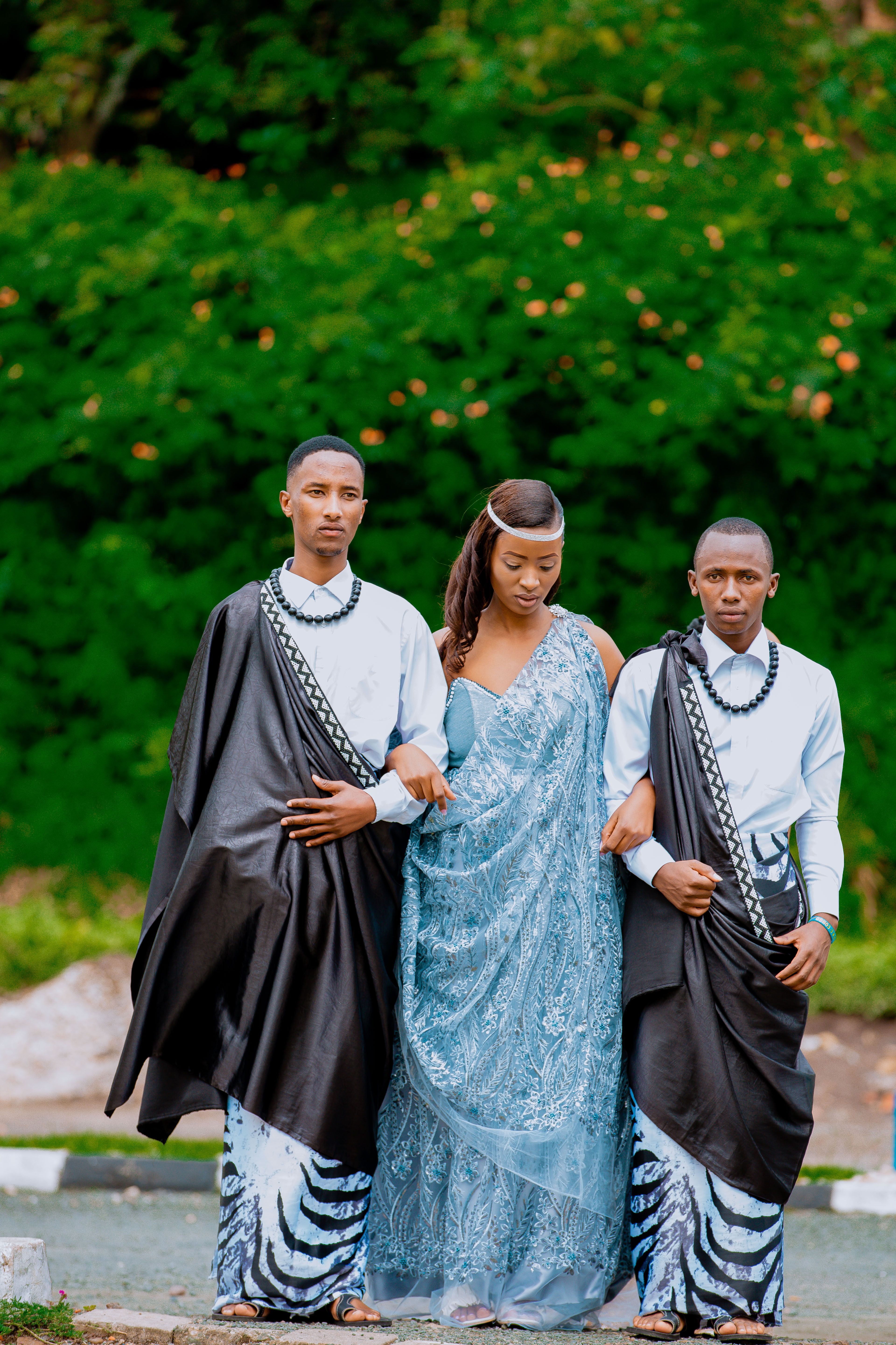 Bride Lead by Two Men Wearing Traditional Clothes · Free Stock Photo