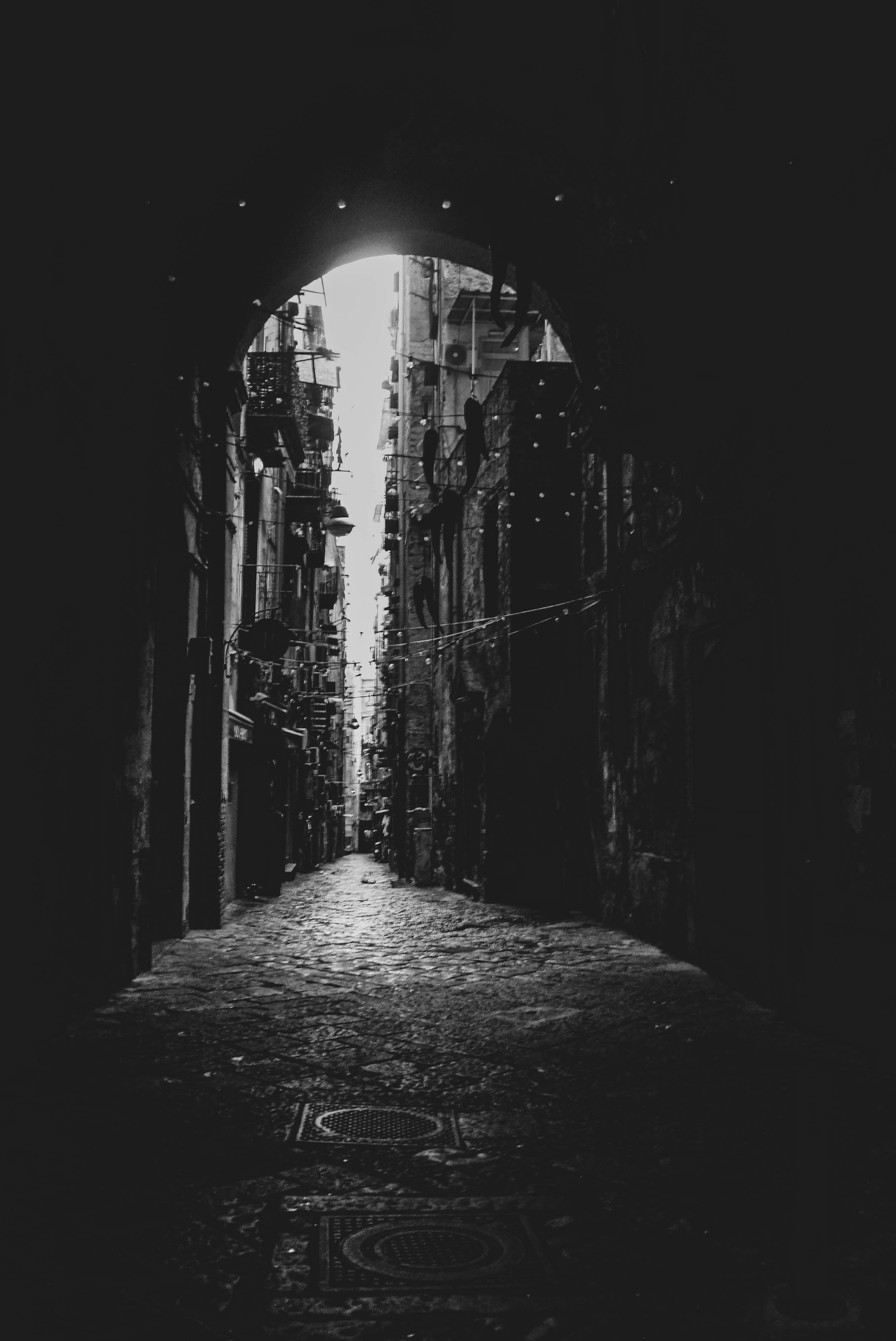 String Lights Hanging Over an Empty Alley · Free Stock Photo