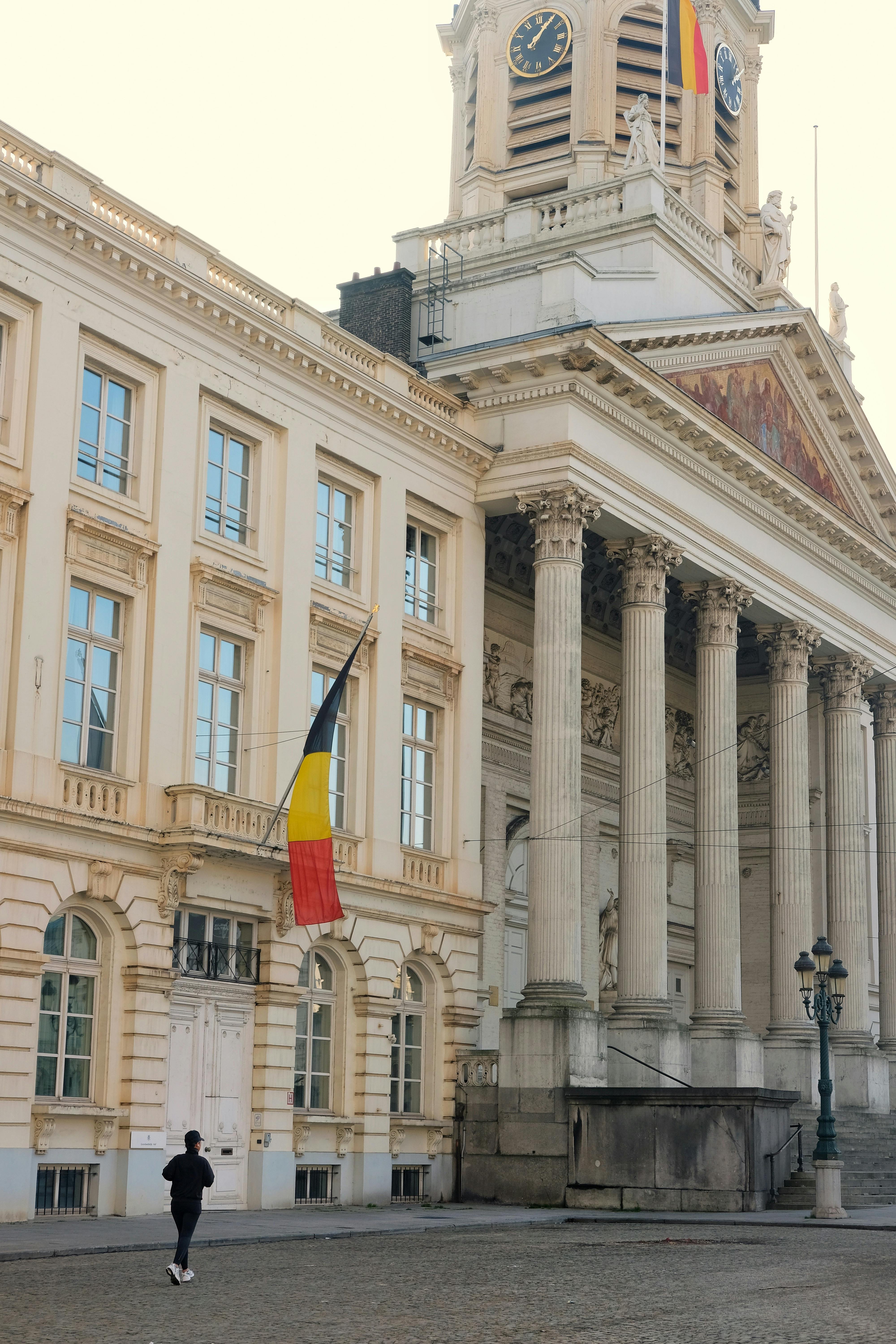 Flags of Romania on Courthouse Building · Free Stock Photo