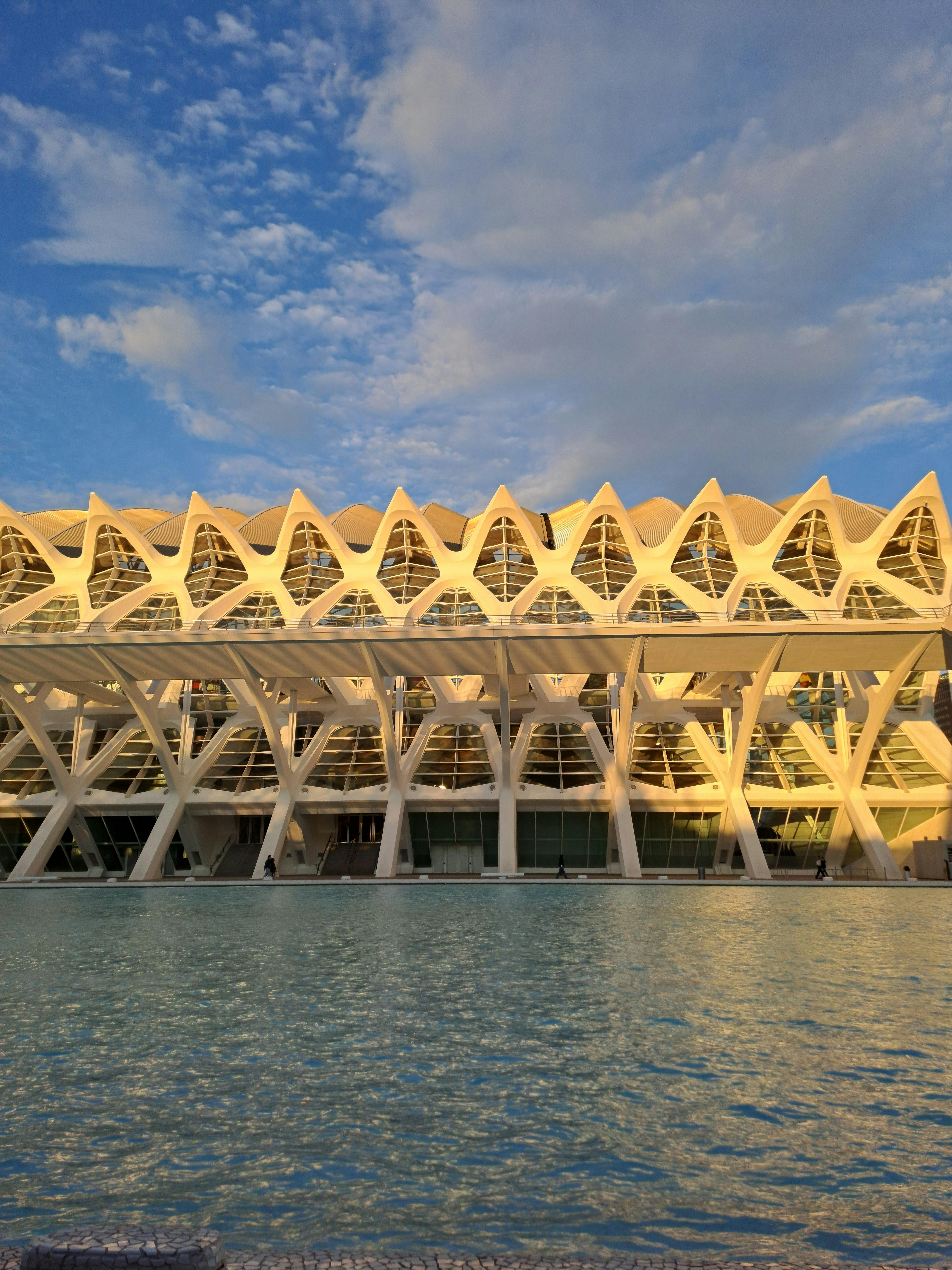 Waterfront with Modern Architectural Structure · Free Stock Photo