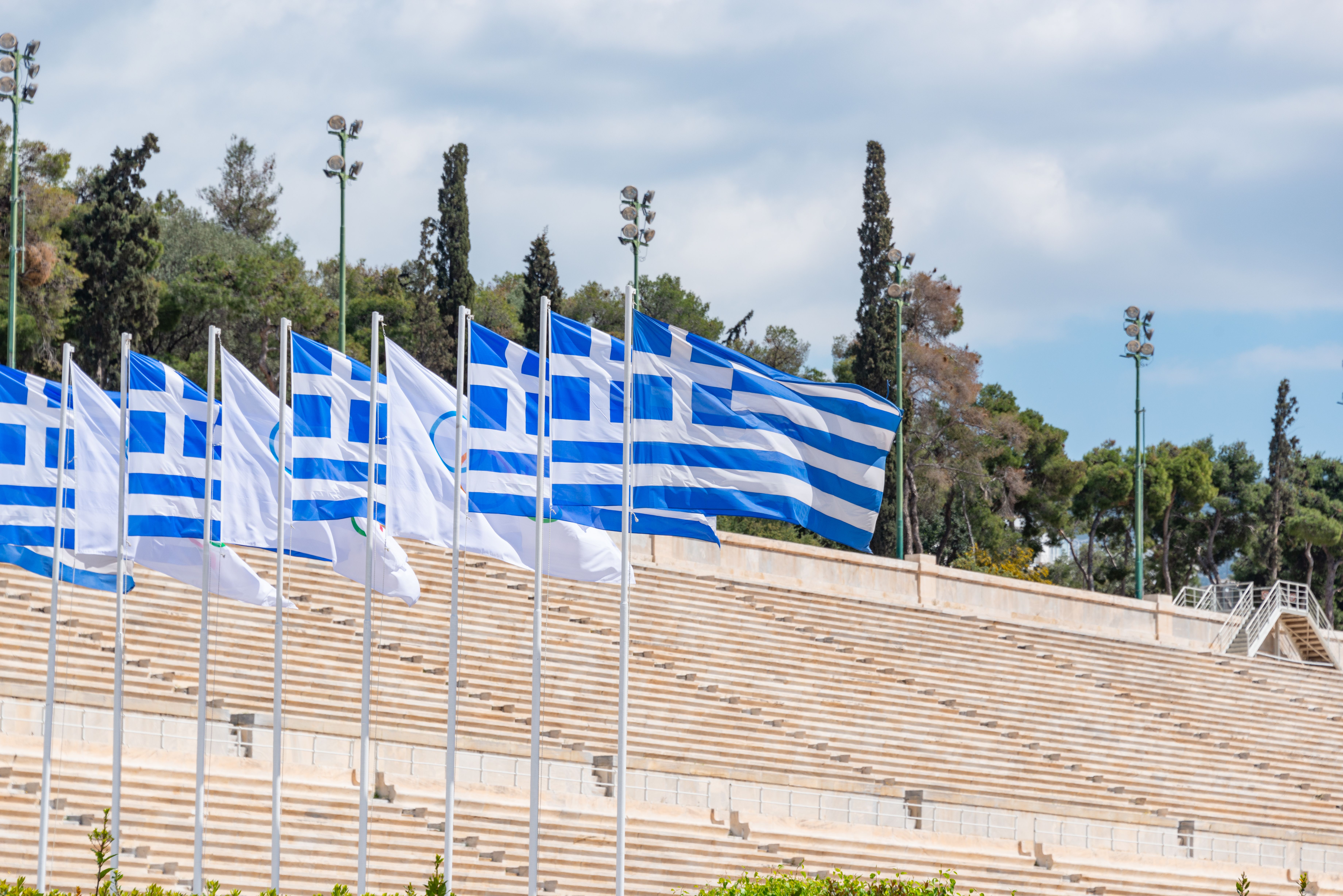 Photo of Greek National Flags on a Stadium · Free Stock Photo
