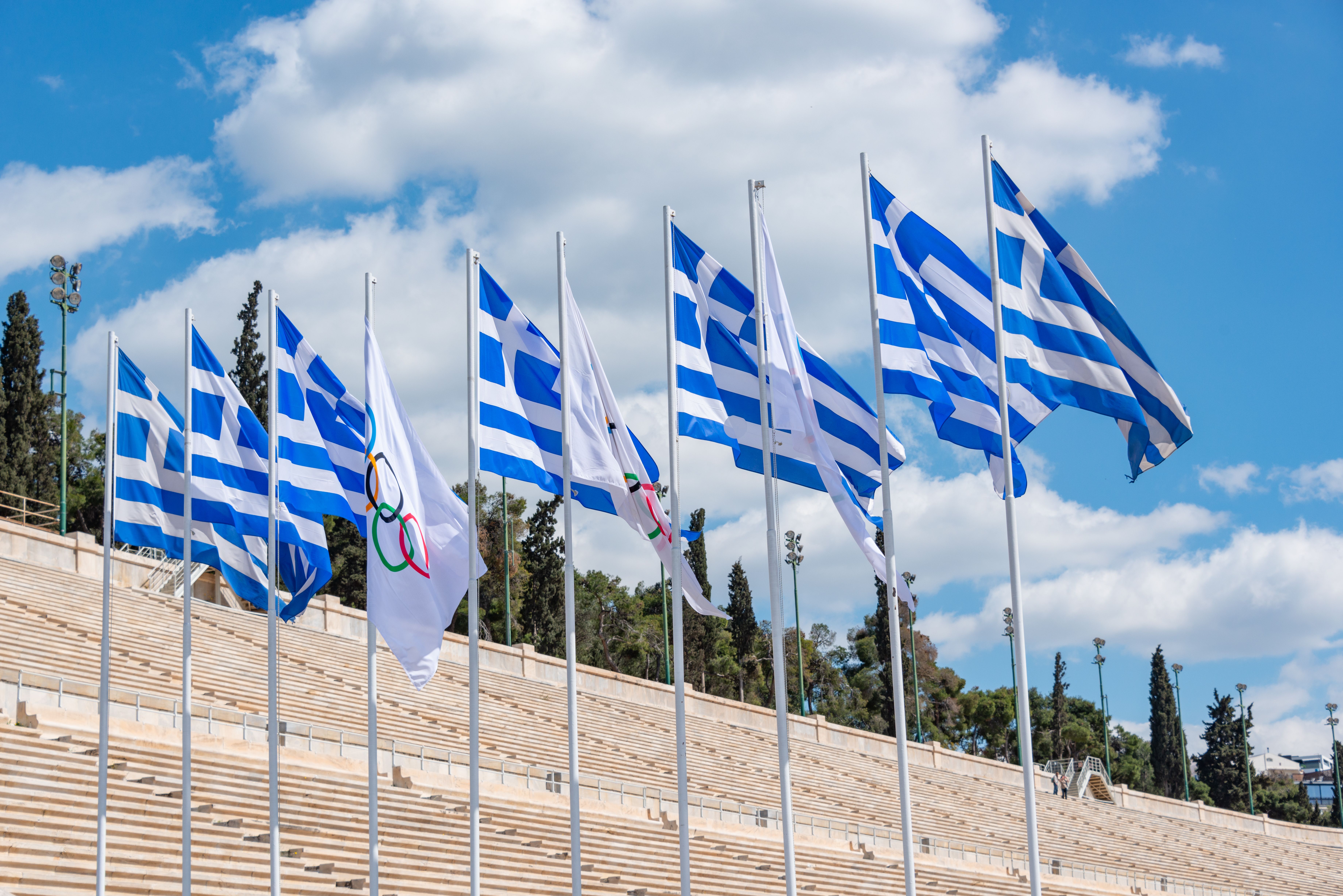 Line of Greece and Olympics Flags · Free Stock Photo