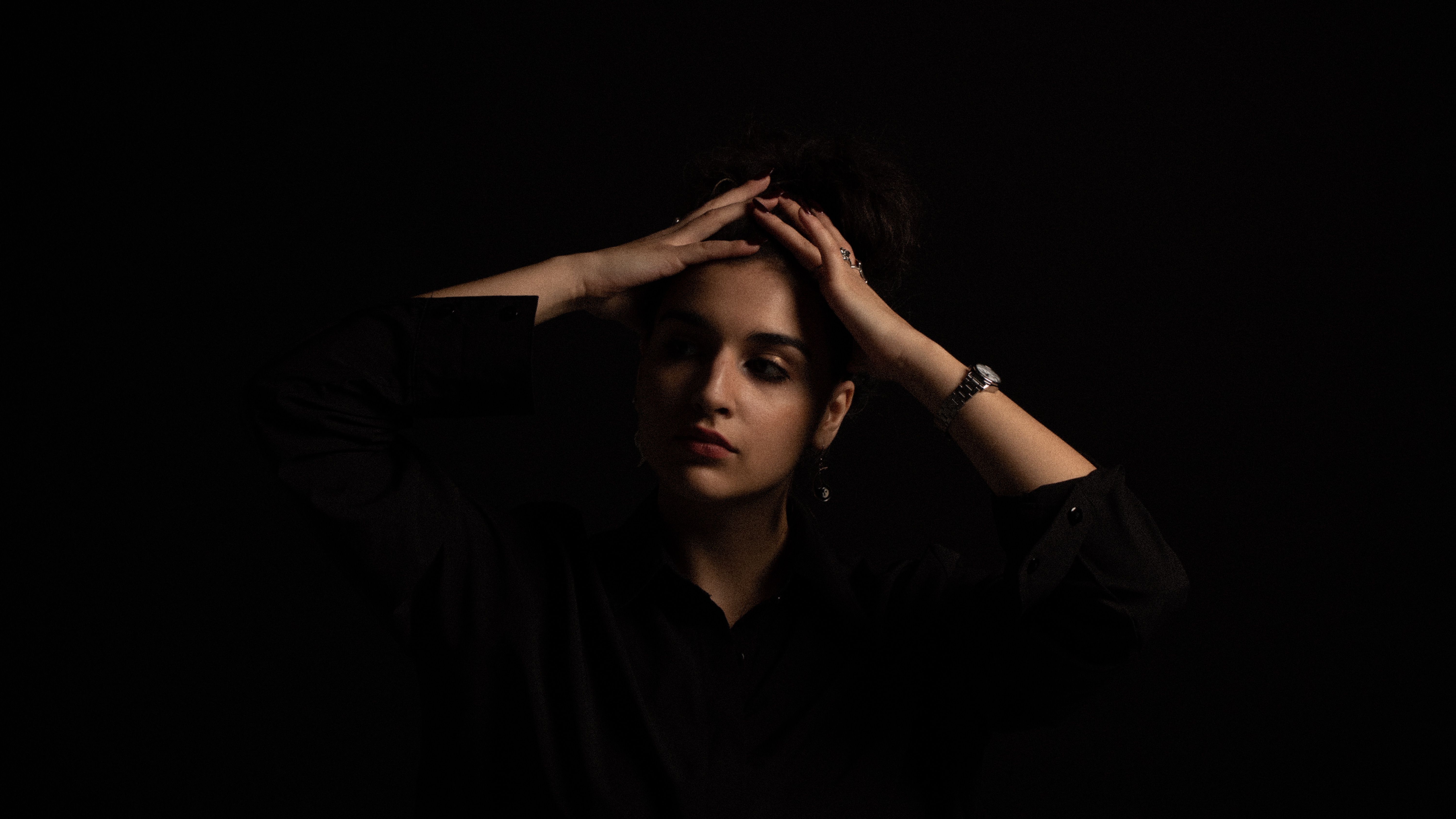 Woman with Her Hands on Her Head · Free Stock Photo