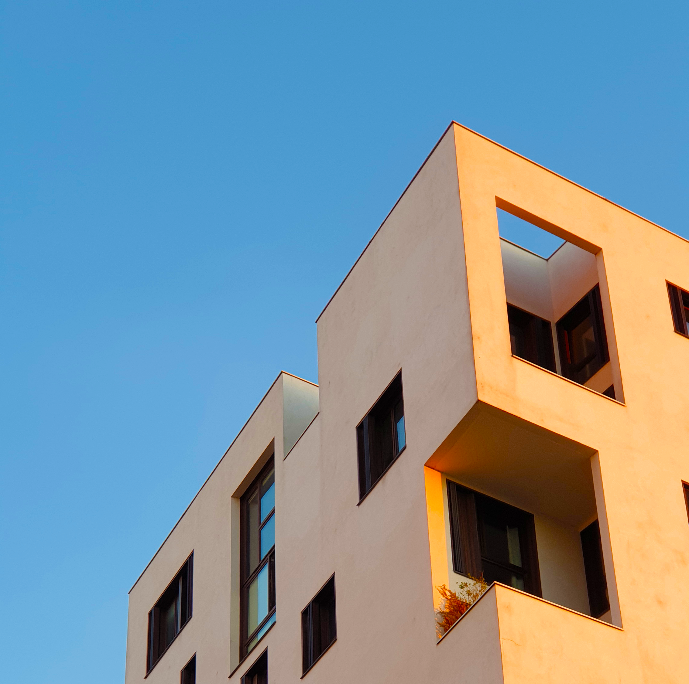 An Orange Building Under the Blue Sky · Free Stock Photo