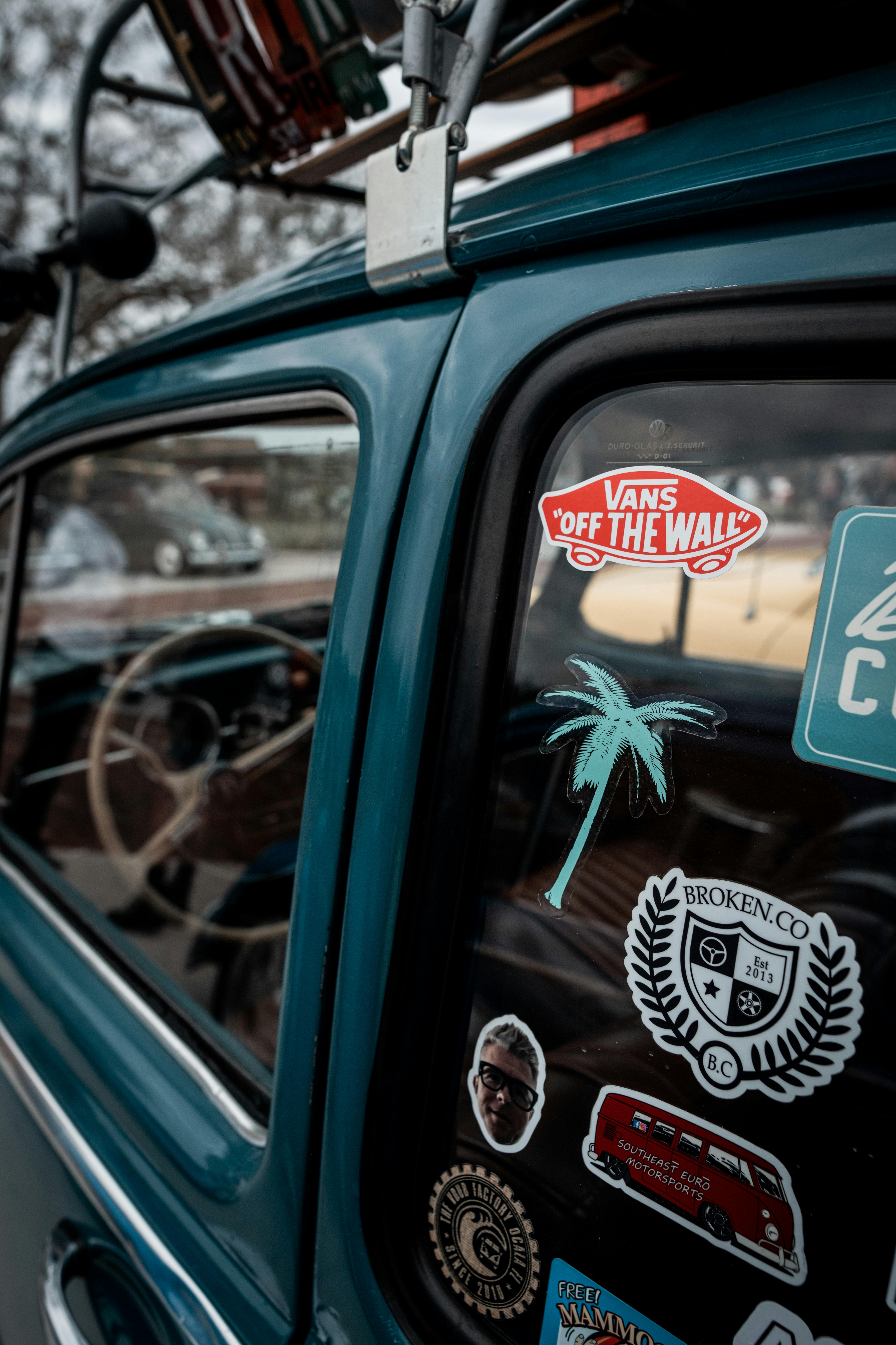 Stickers on Windows of Vintage Car · Free Stock Photo