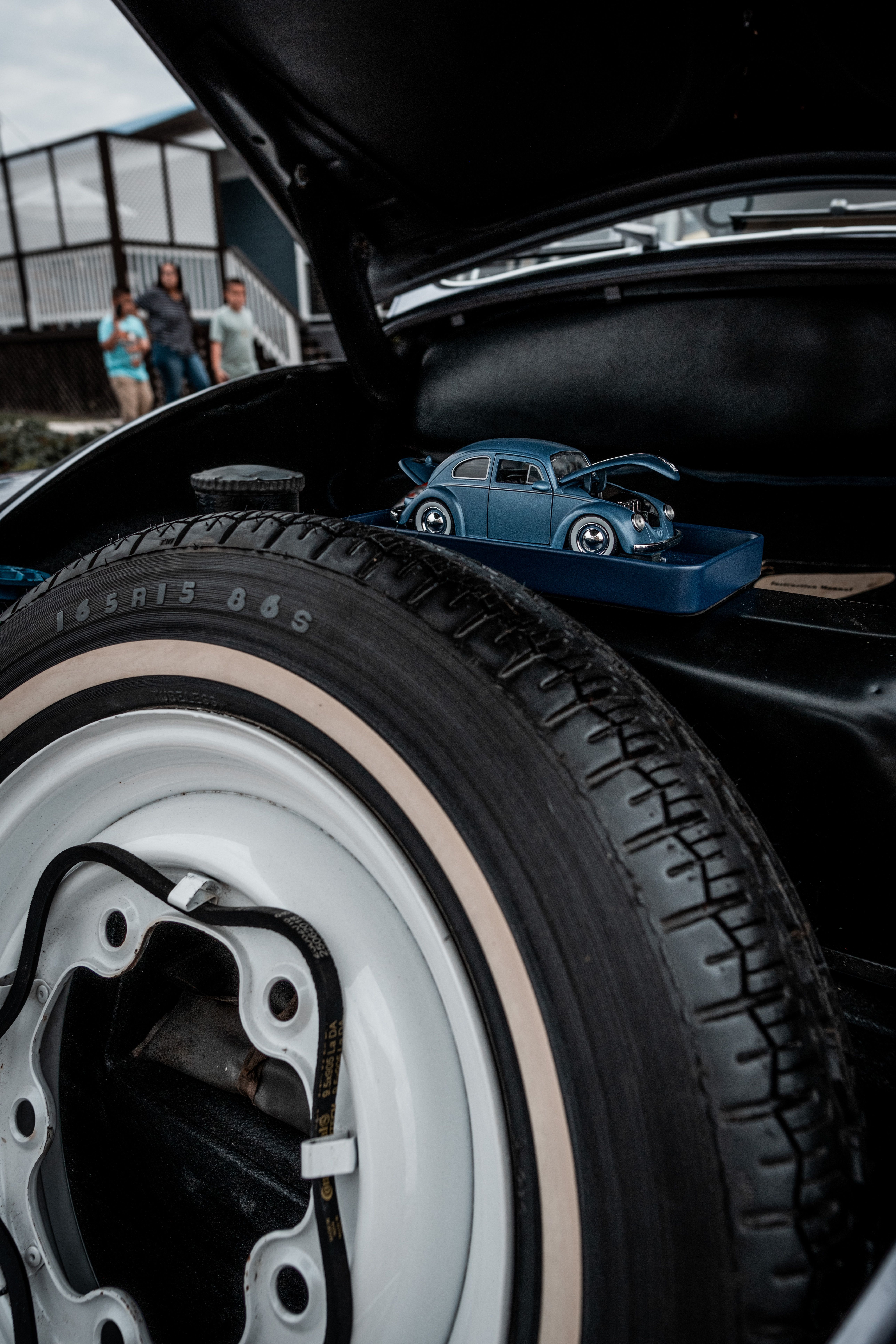 Blue Toy Car of Volkswagen Beetle Next to Spare wheel Under the Hood of ...