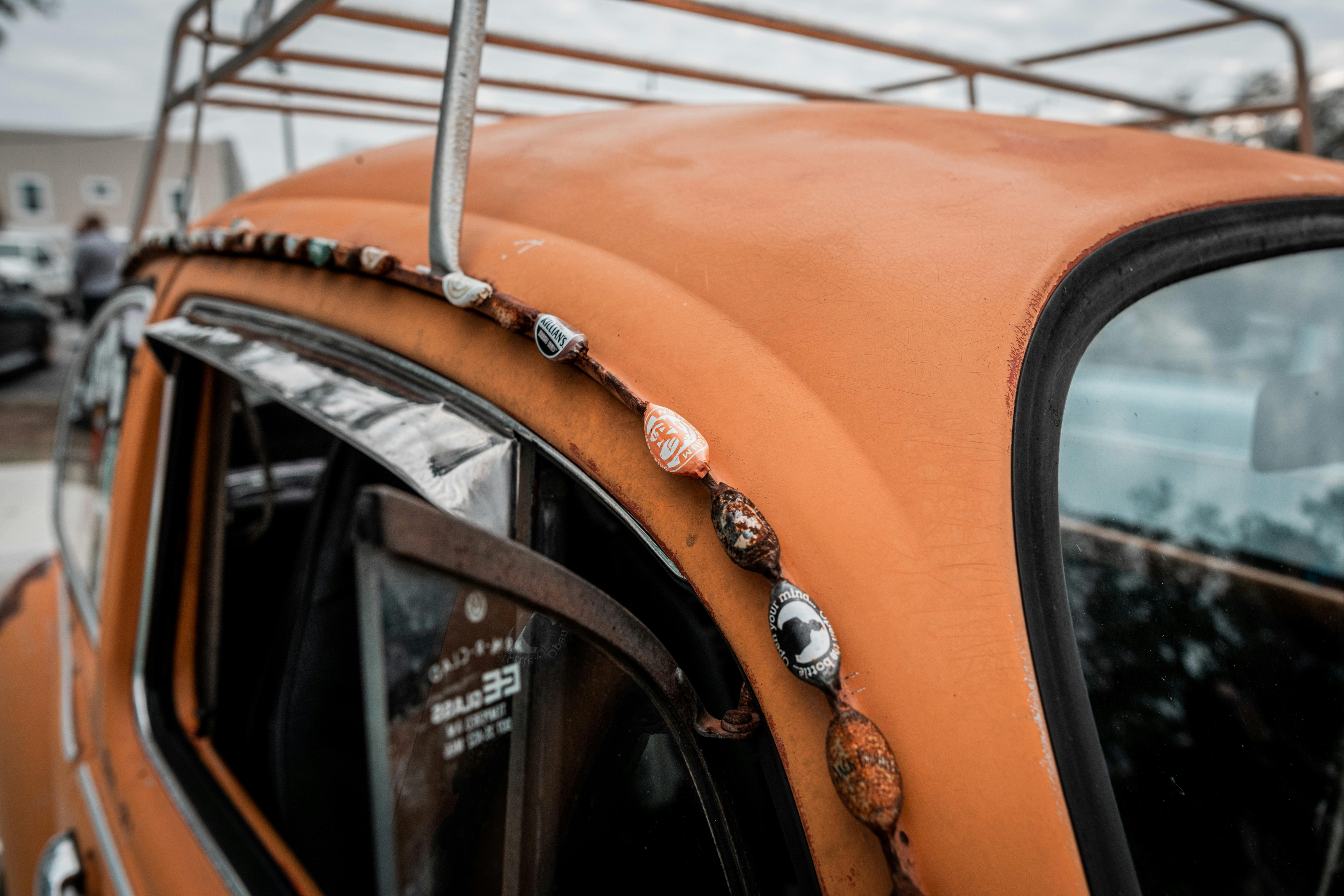 Close Up Photo of Orange Rusty Vintage Car · Free Stock Photo