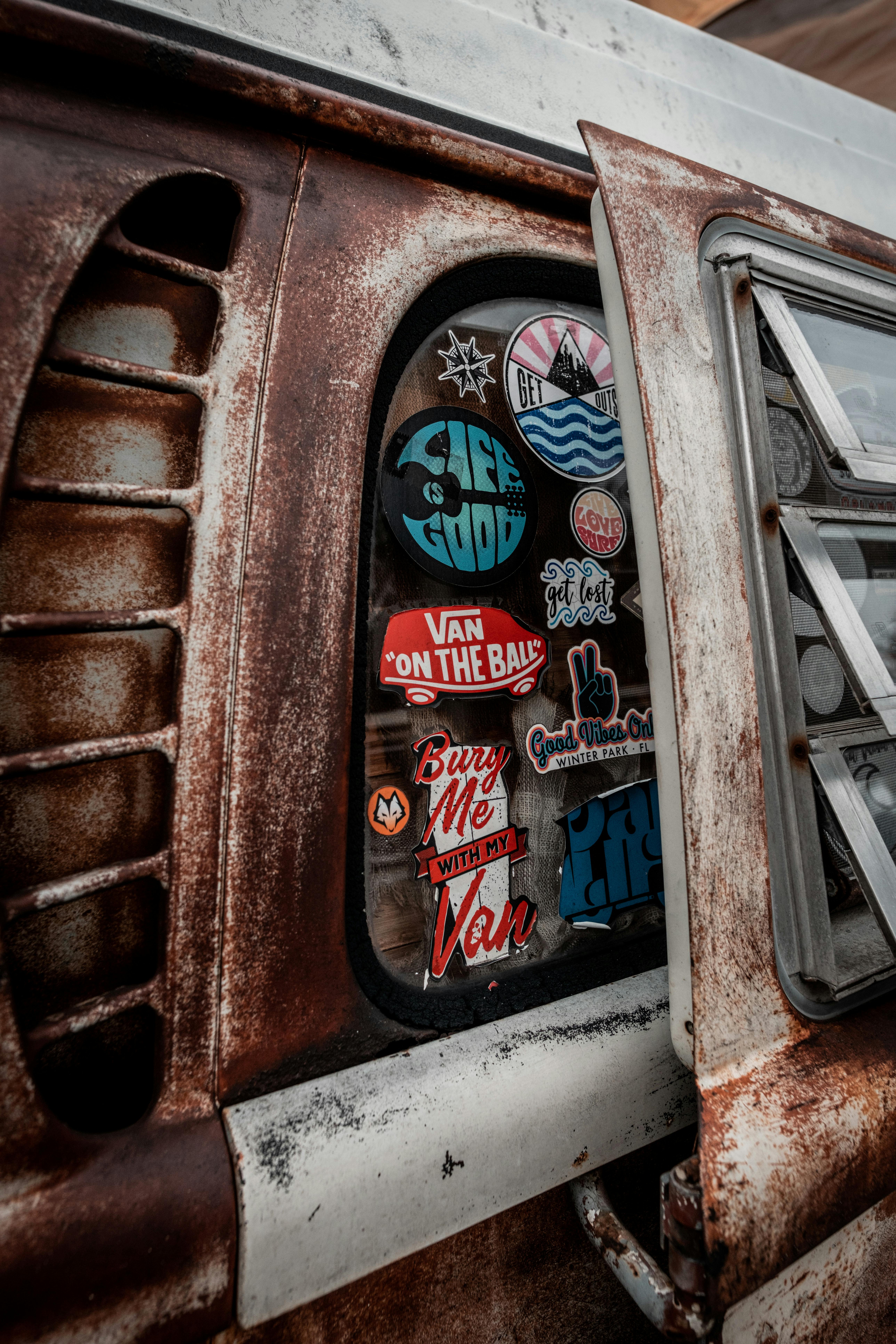 Stickers on Rusty Car · Free Stock Photo