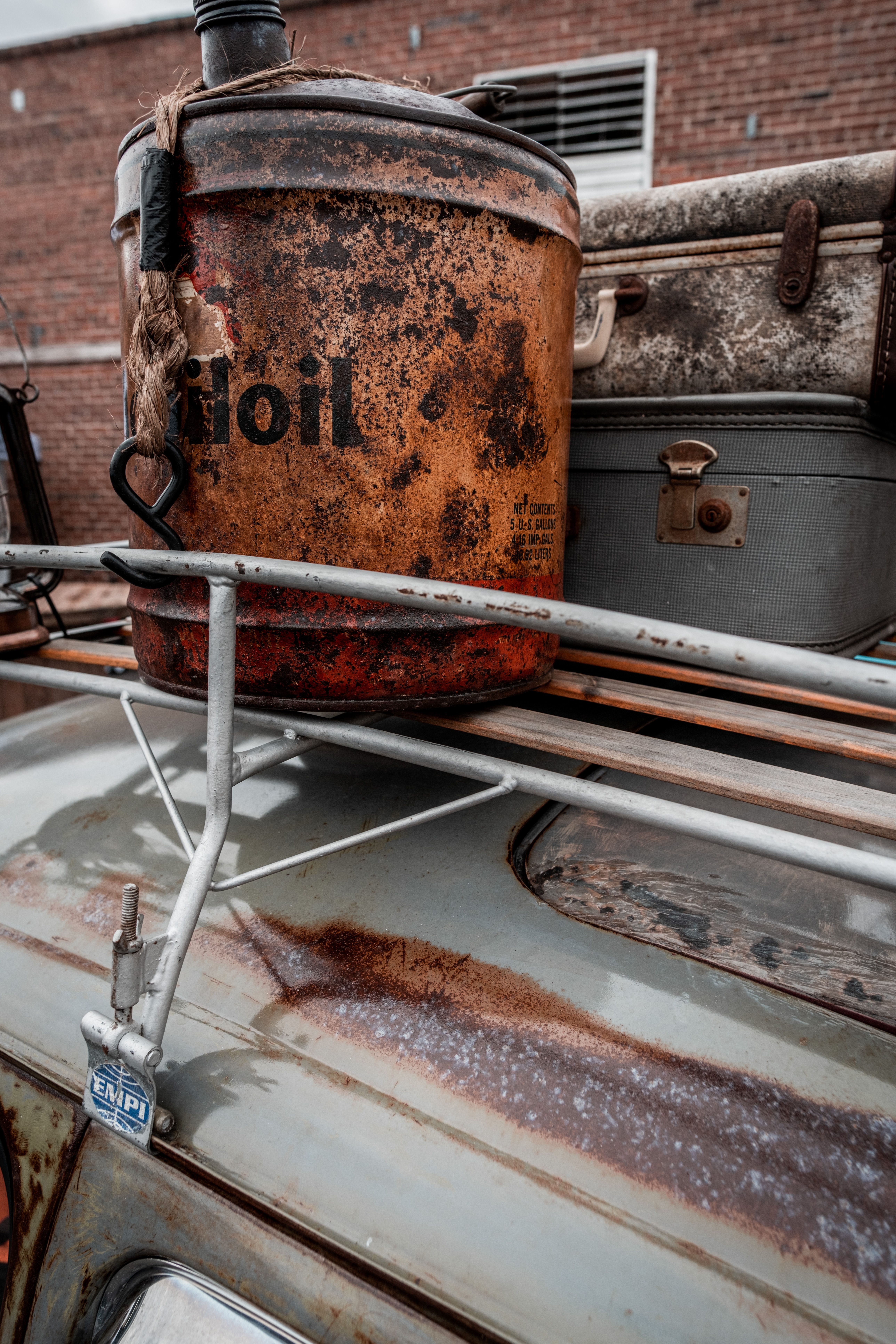 Rusty Can on Car Roof · Free Stock Photo