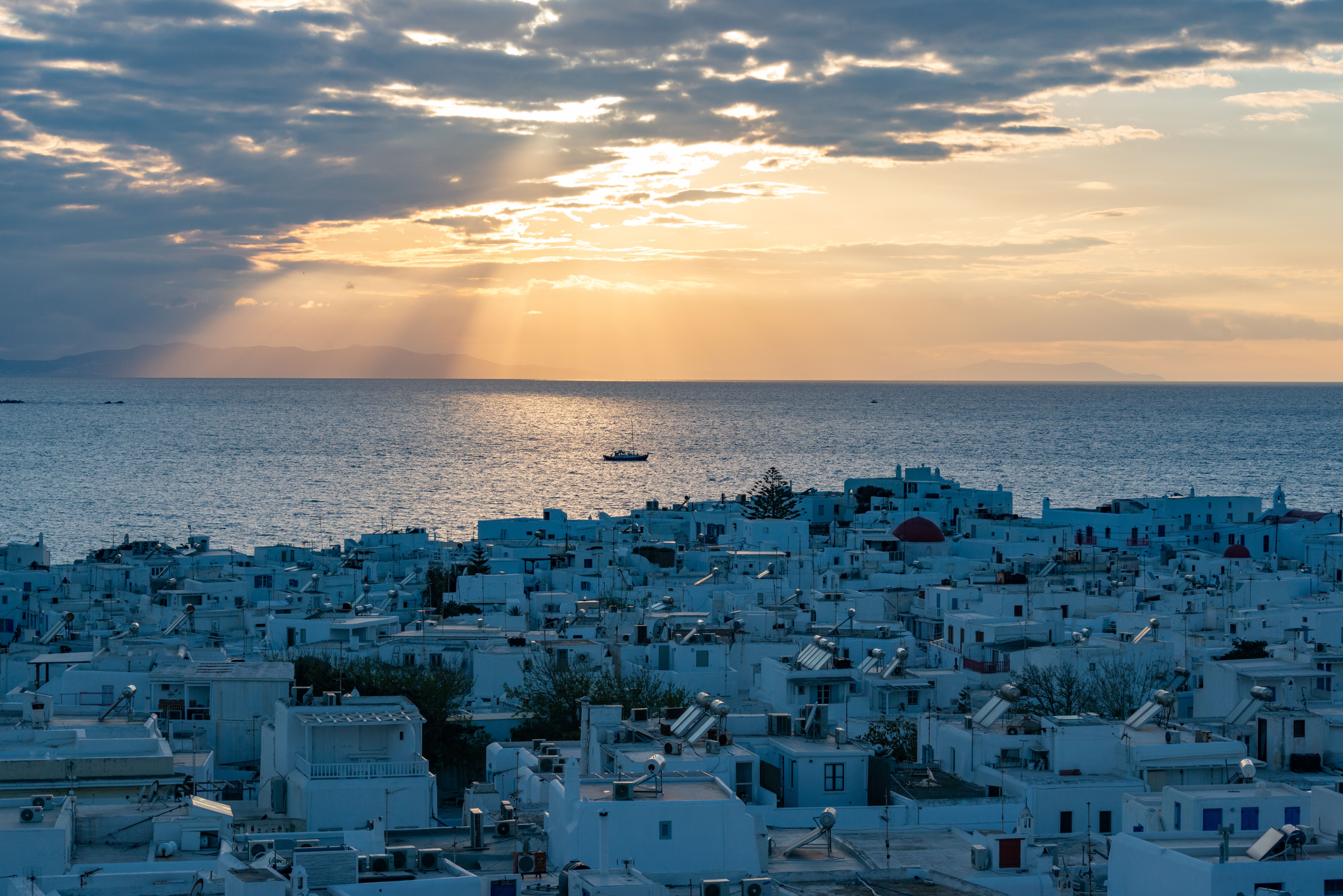 Sunset above Traditional Town on Seashore · Free Stock Photo