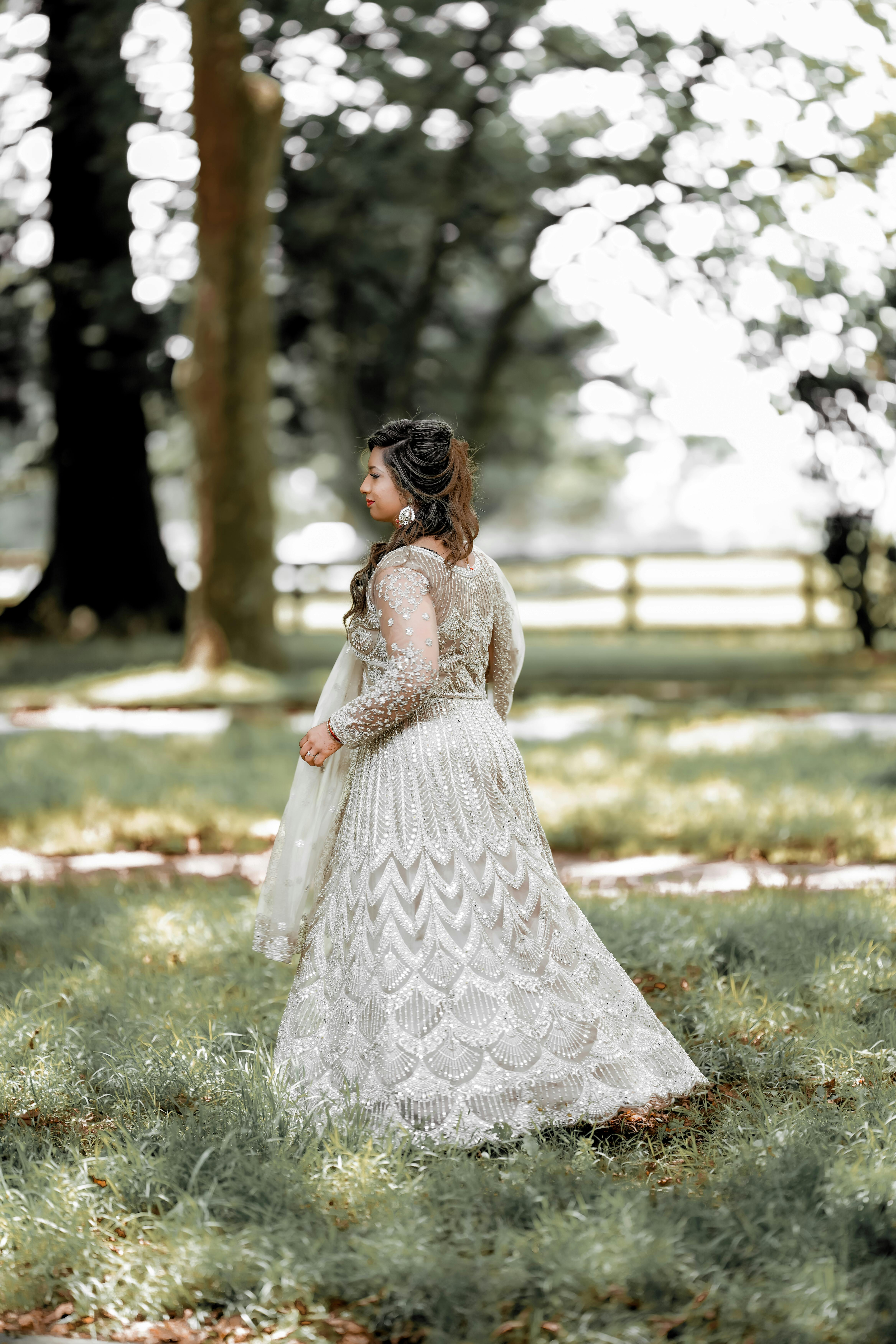 Woman In Elegant Light Colored Outfit · Free Stock Photo