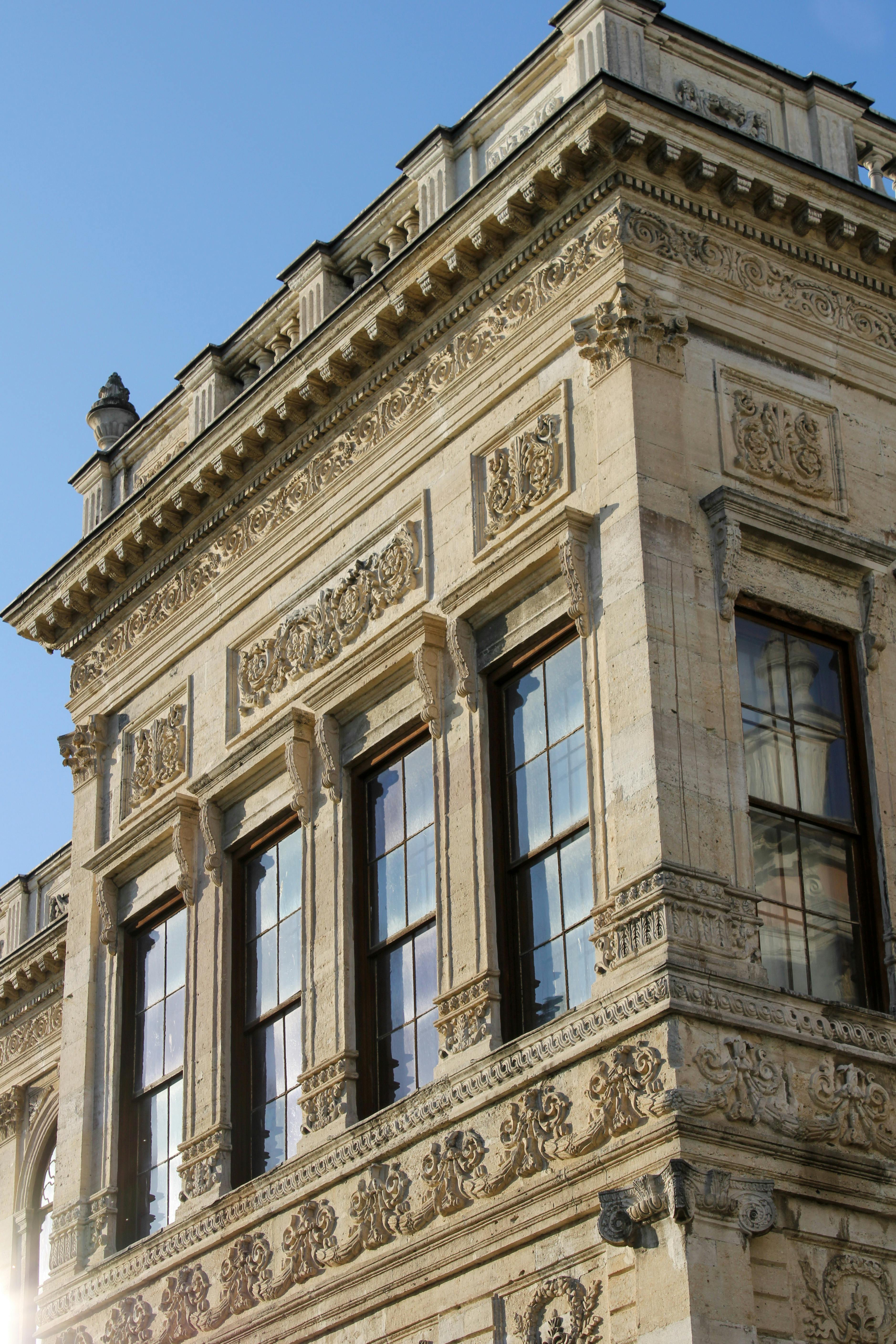 Old Classic Building Facade on Sky Background · Free Stock Photo