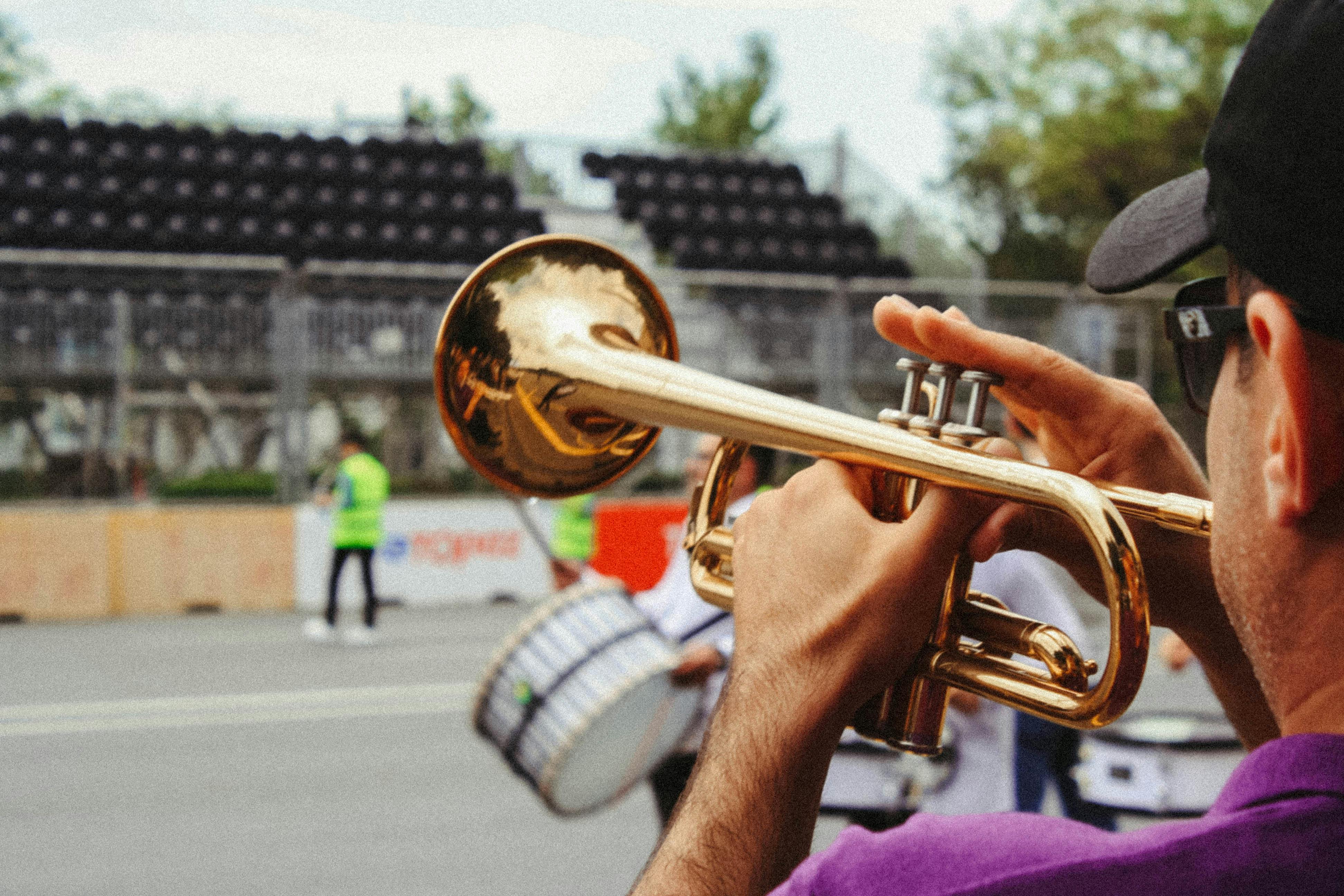 Man Playing Musical Instrument Outdoors · Free Stock Photo