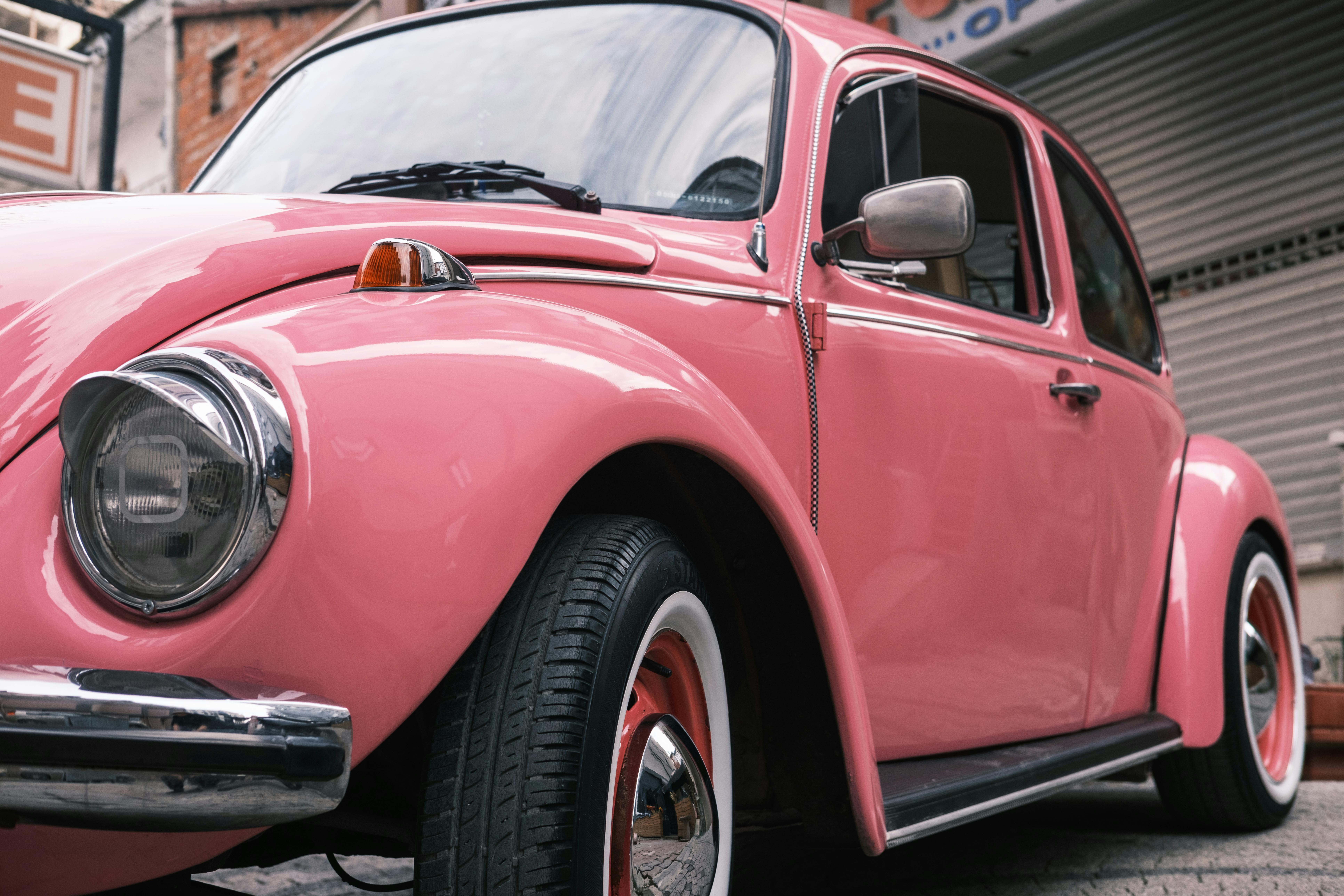 Low-Angle Shot of a Pink Car · Free Stock Photo