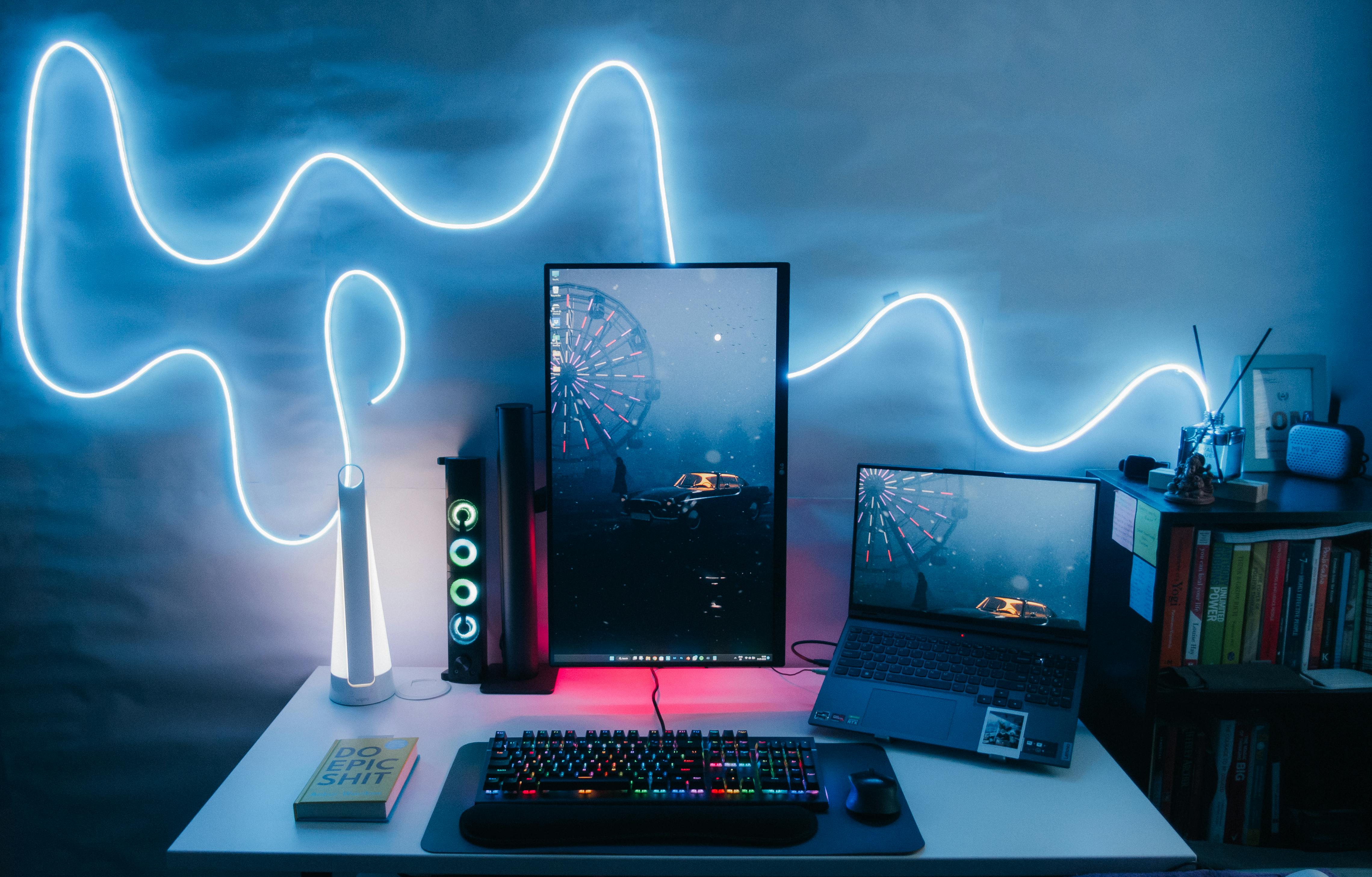A Computer Setup on a Wooden Desk · Free Stock Photo