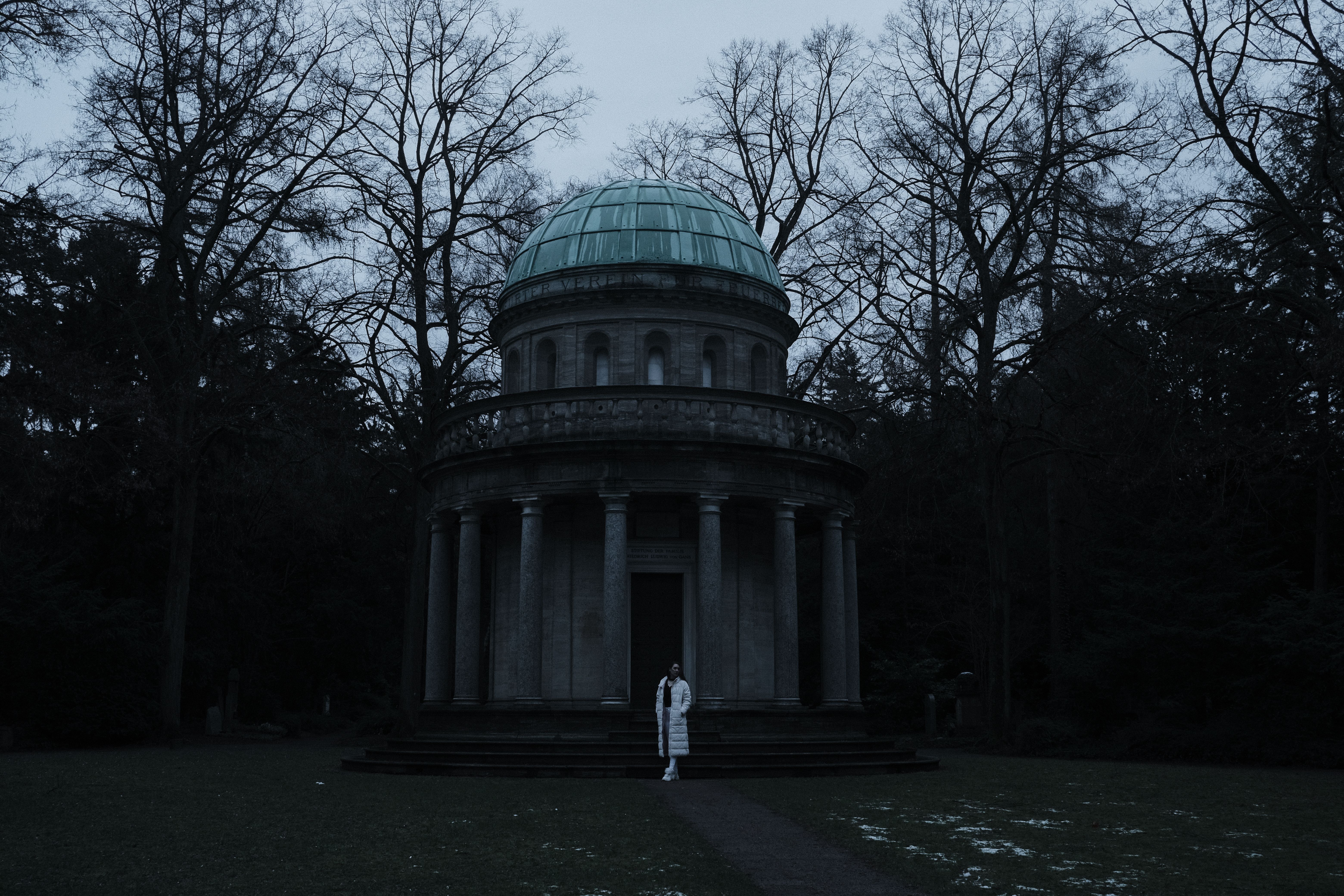 A Woman Standing in Front of the Mausoleum Gans in Frankfurt Germany ...