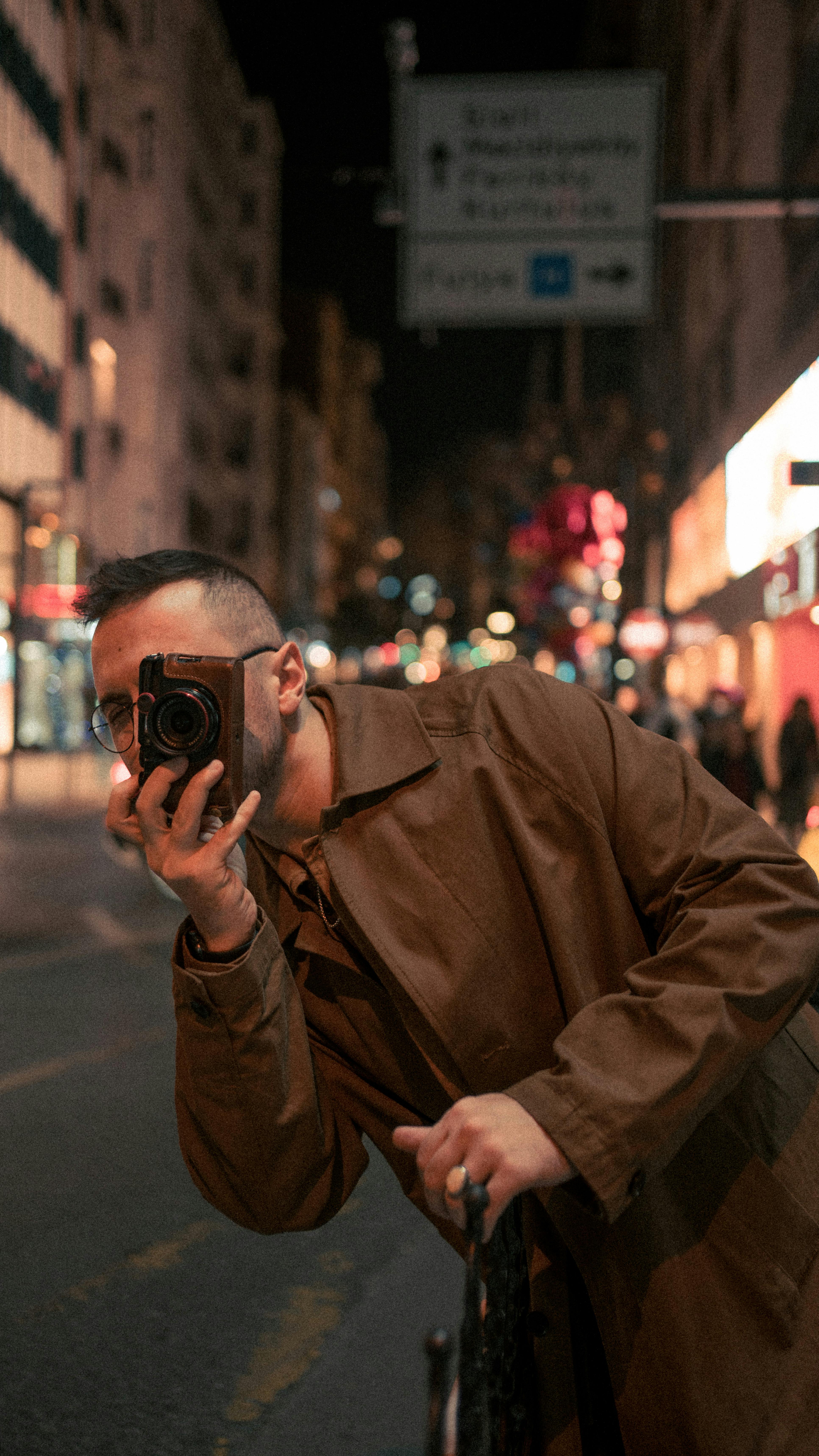 Man Taking Photo on Street · Free Stock Photo
