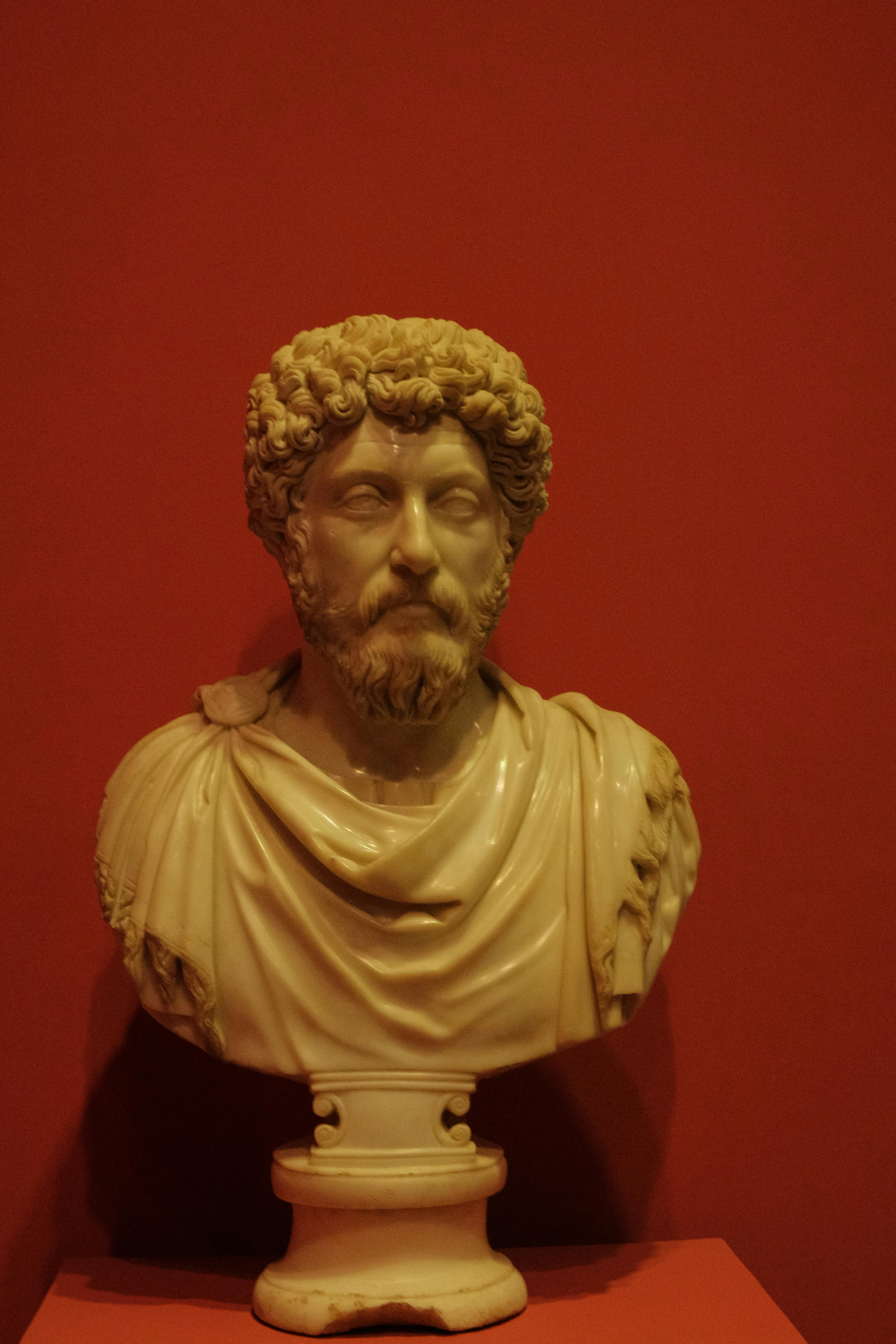 Ancient Statue on Pedestal in Museum · Free Stock Photo