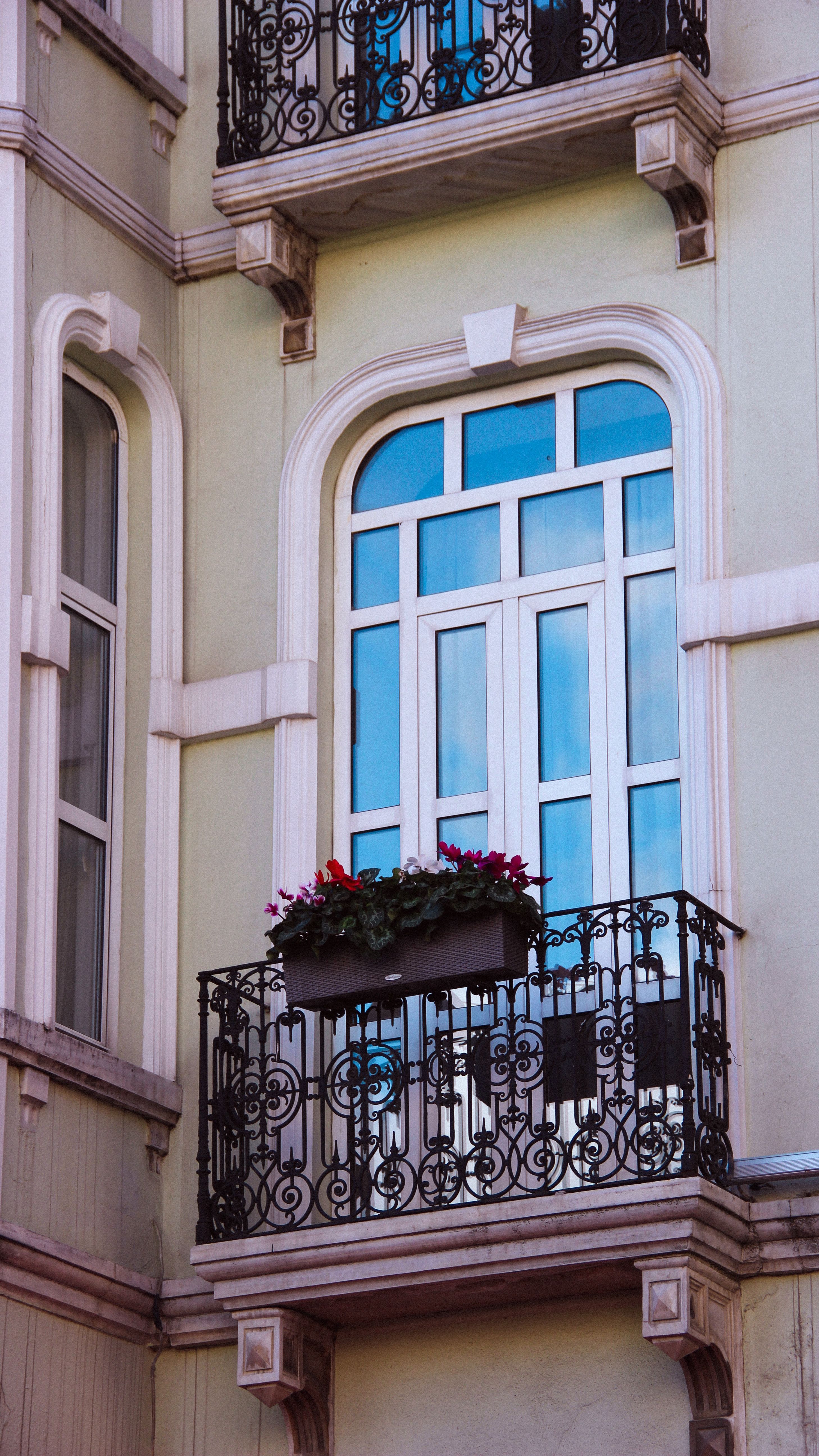 Mountains Seen between Residential Buildings · Free Stock Photo
