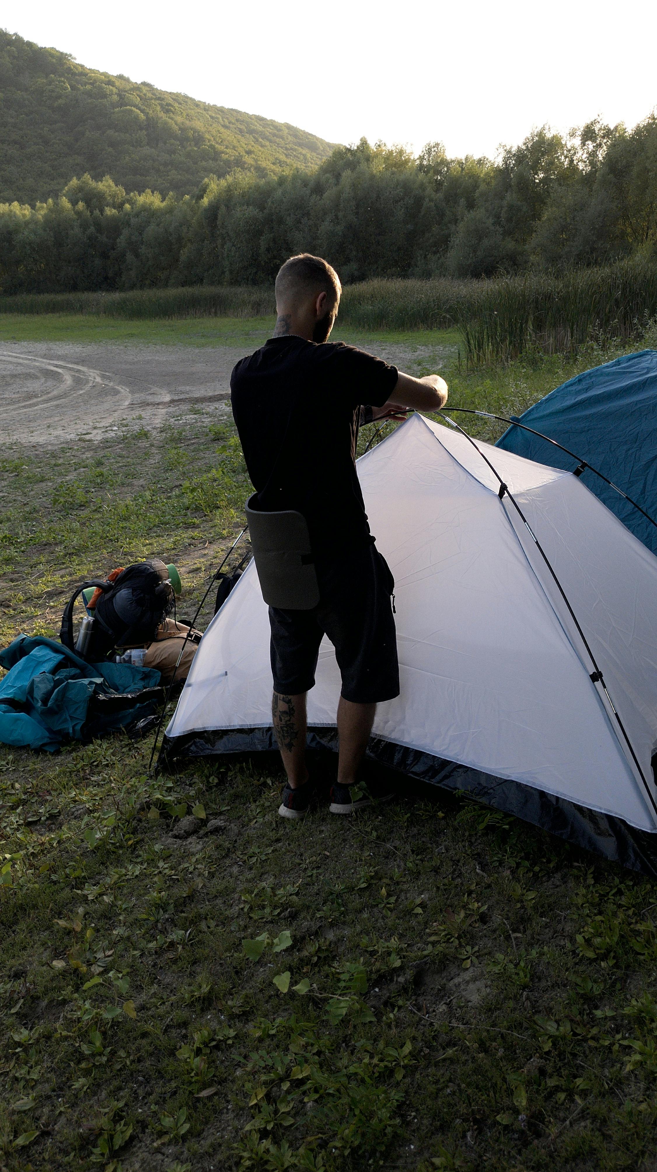 Man Setting Tent Up · Free Stock Photo