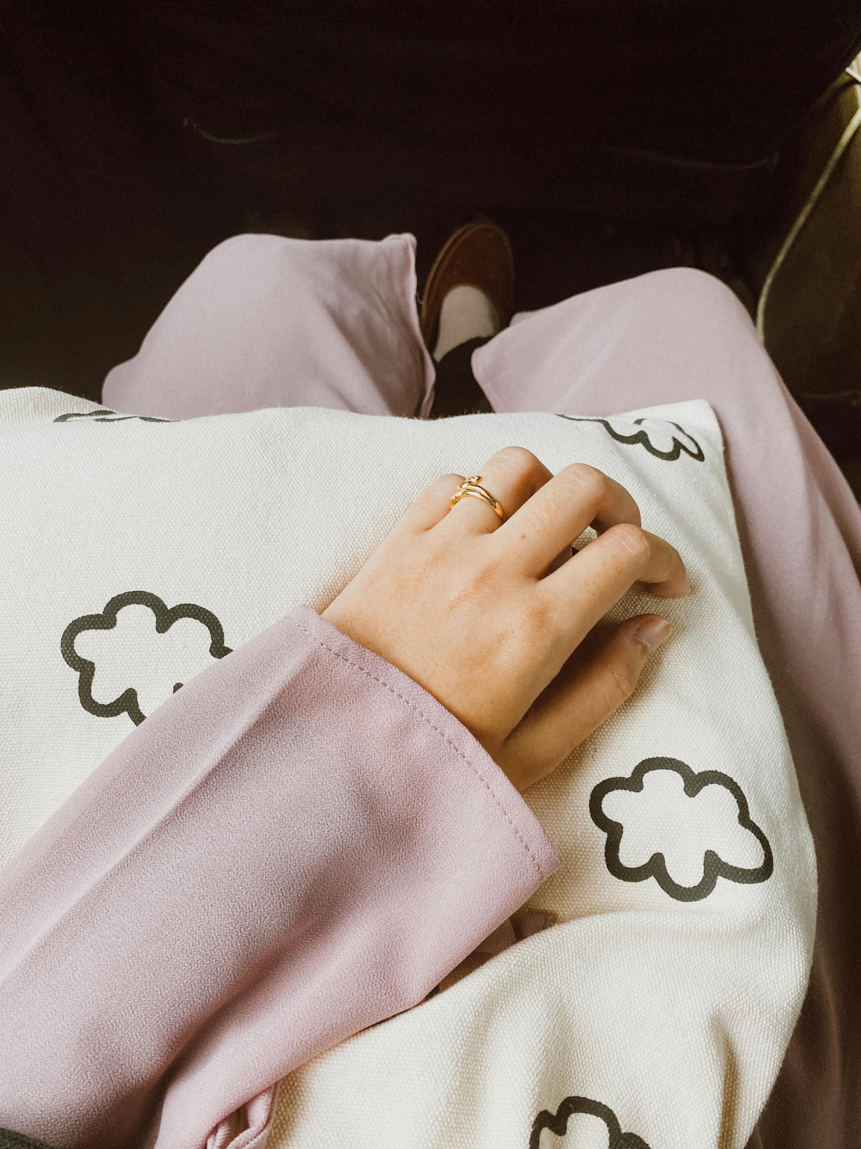 Woman Hand on Pillow · Free Stock Photo