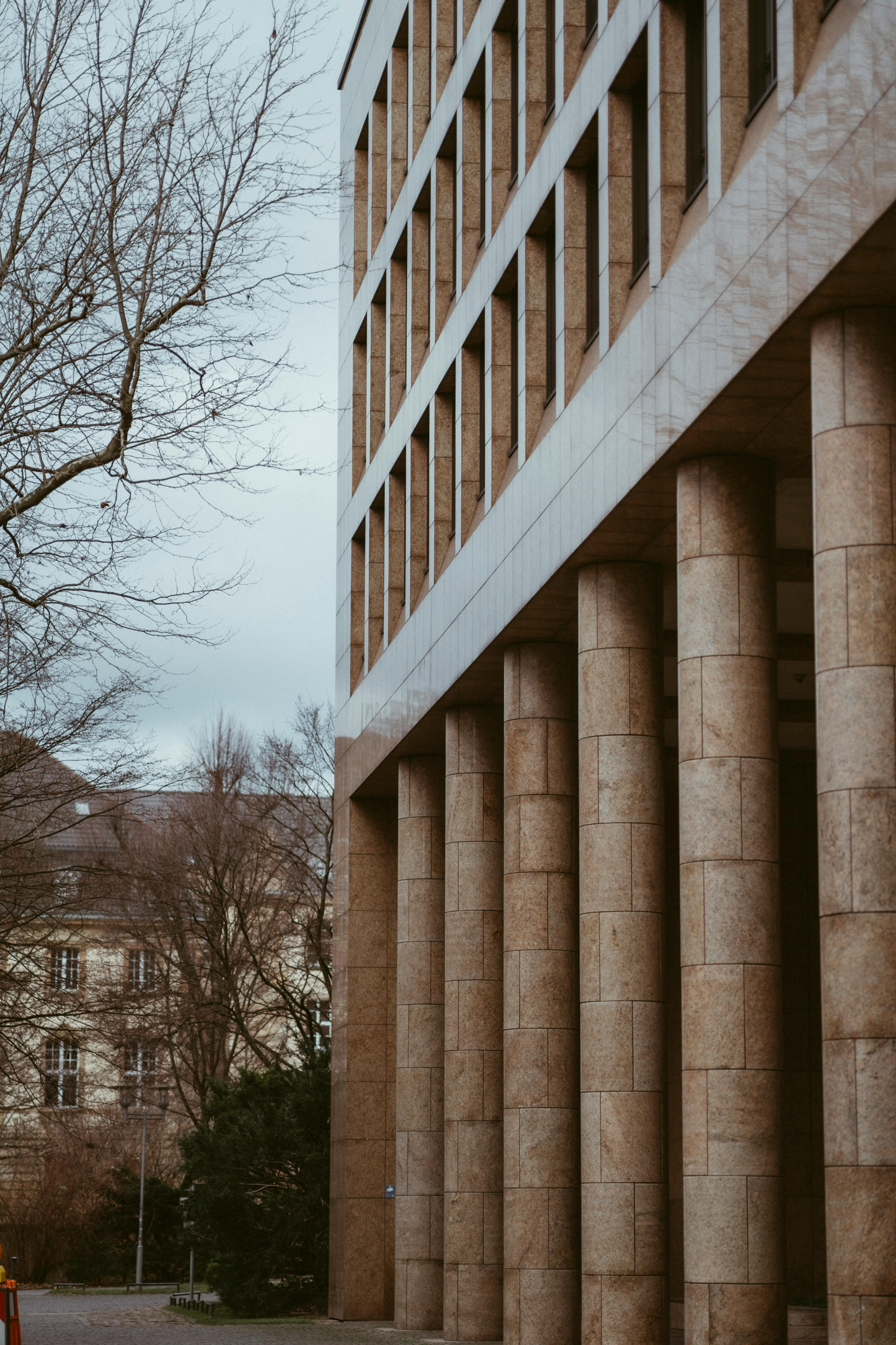 Modern Colonnade in Front of Office Buildings · Free Stock Photo