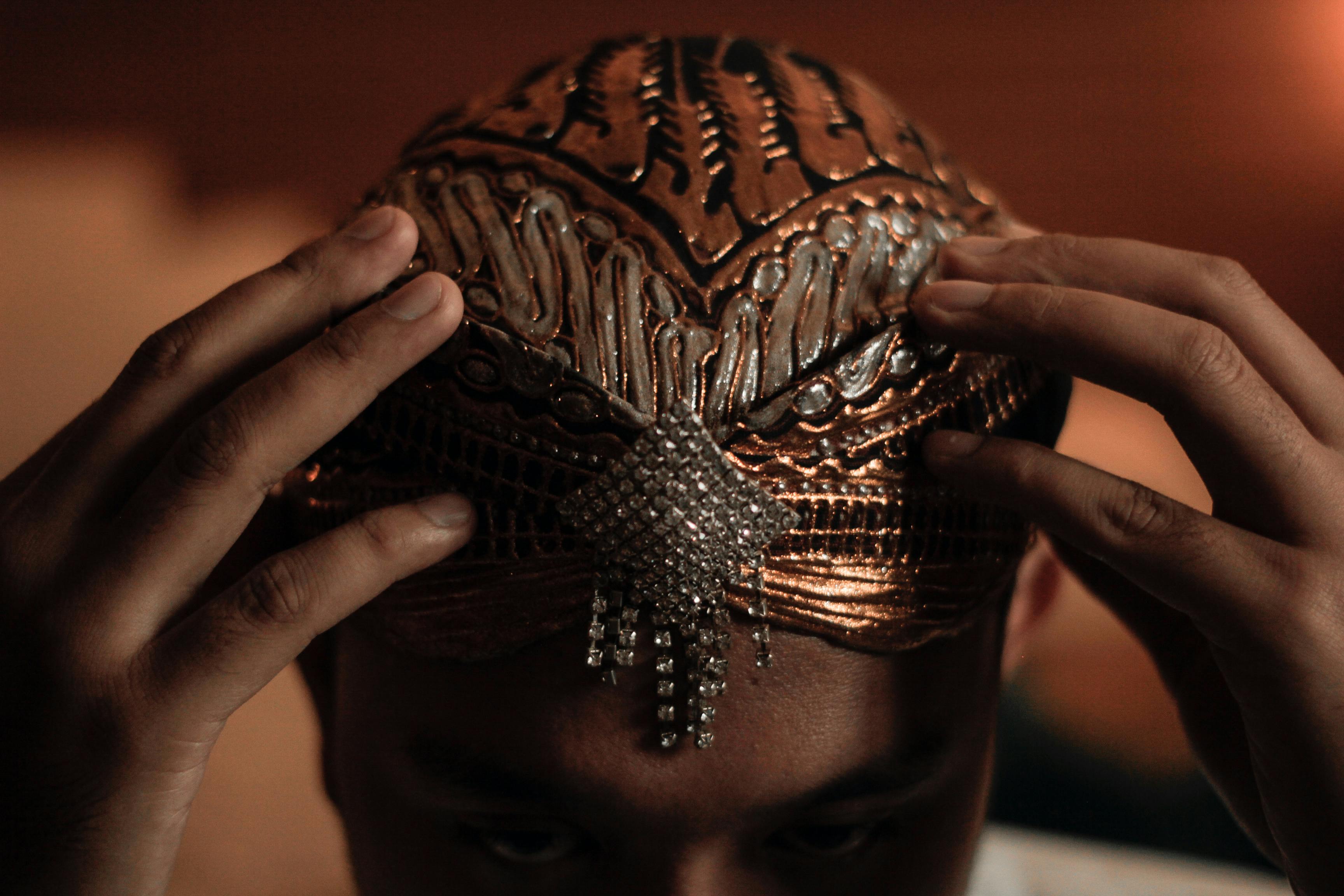 Closeup of a Copper Colour Decorative Traditional Hat · Free Stock Photo