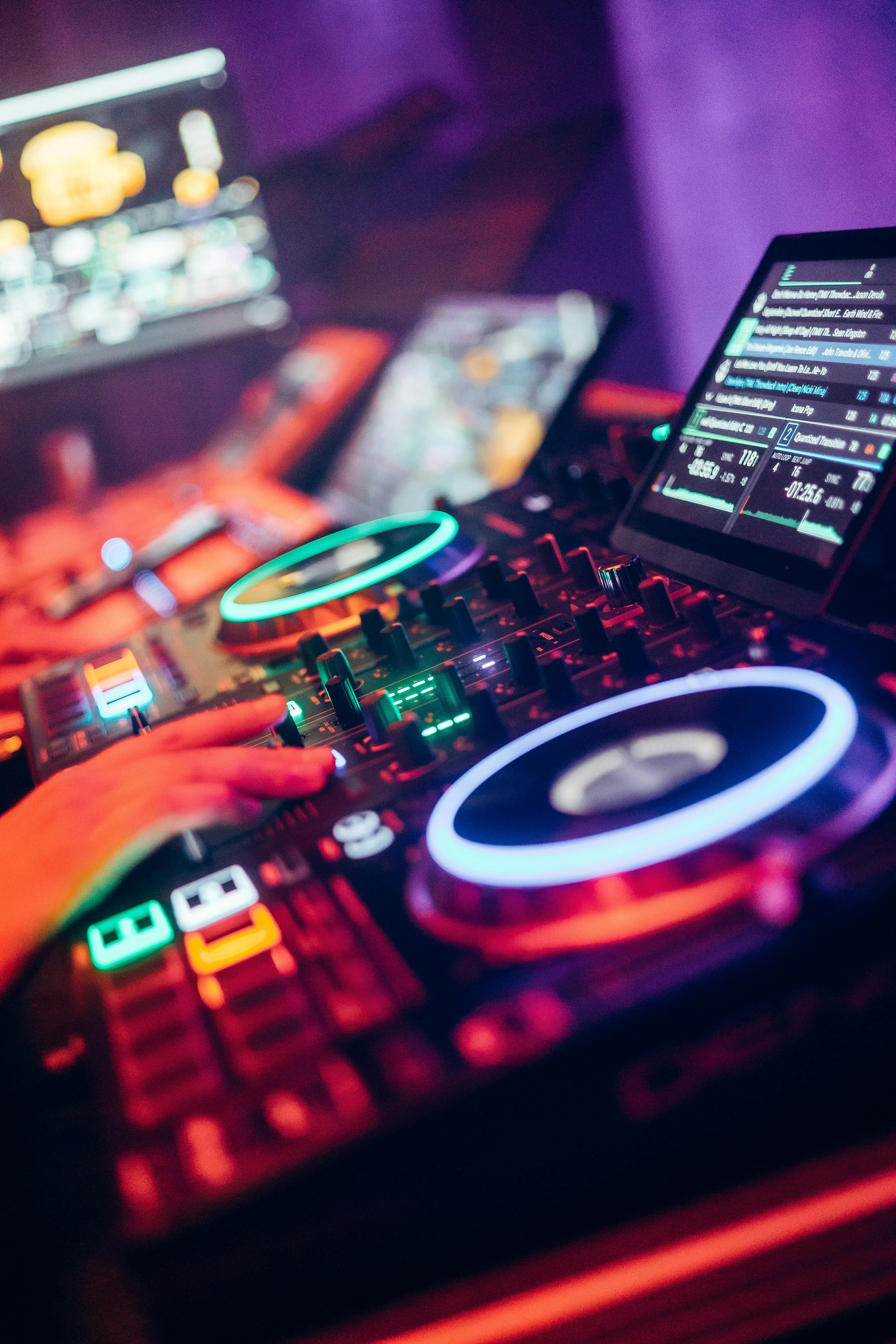 Closeup of an Illuminated Analogue Sound Mixer · Free Stock Photo