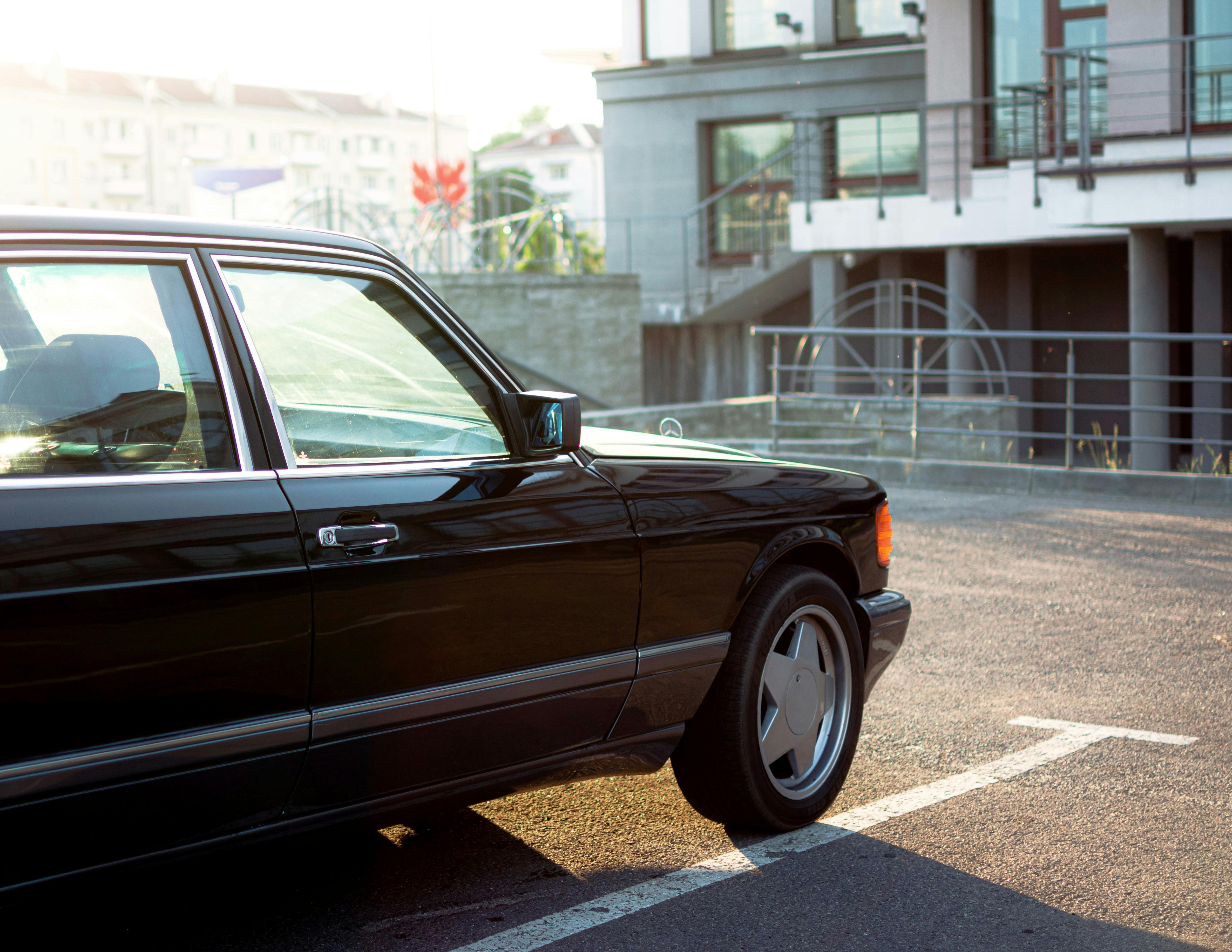Back View of Cars on the Parking Lot · Free Stock Photo