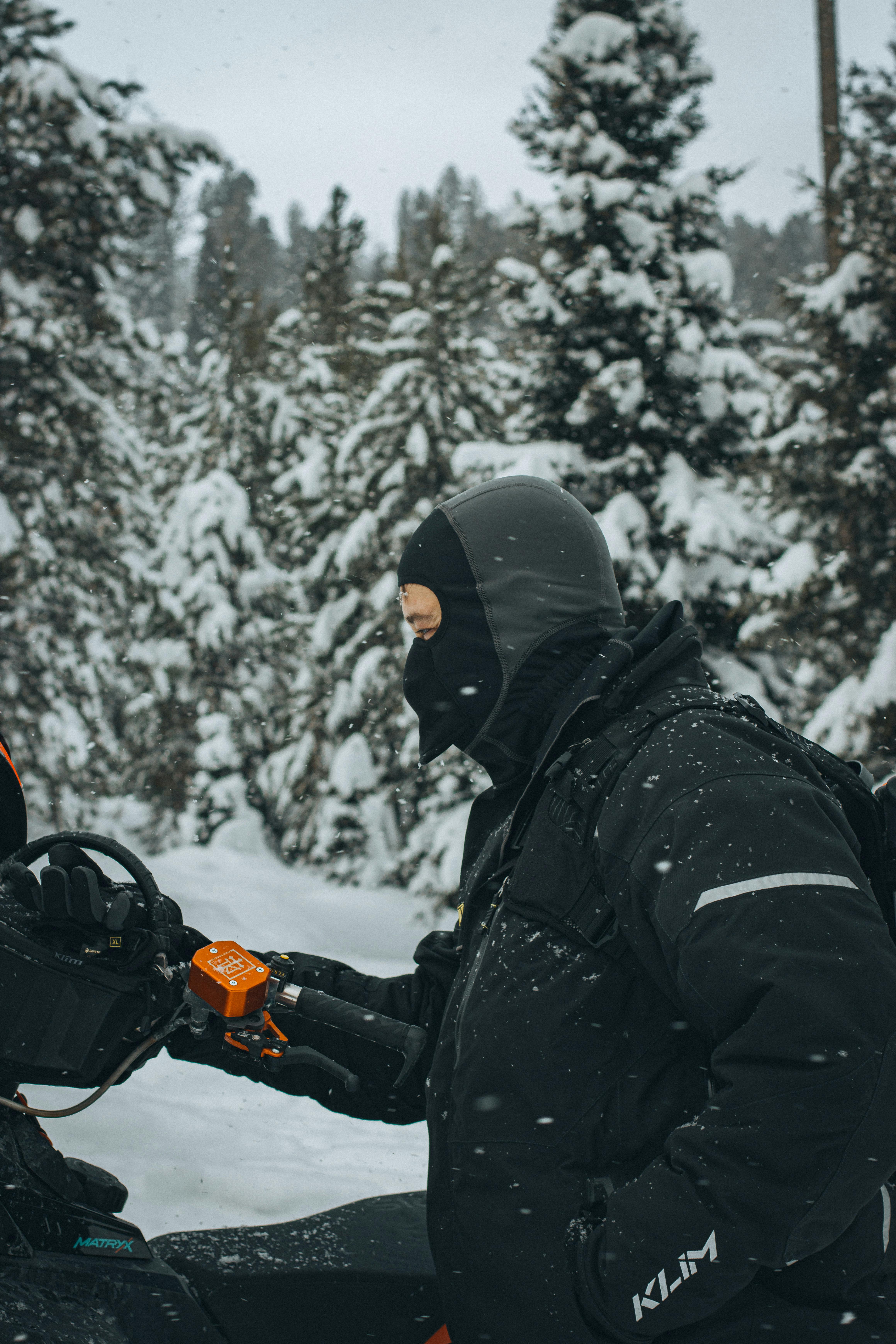 Man In Blue And Green Long-sleeved Suit Riding On Snowmobile · Free ...