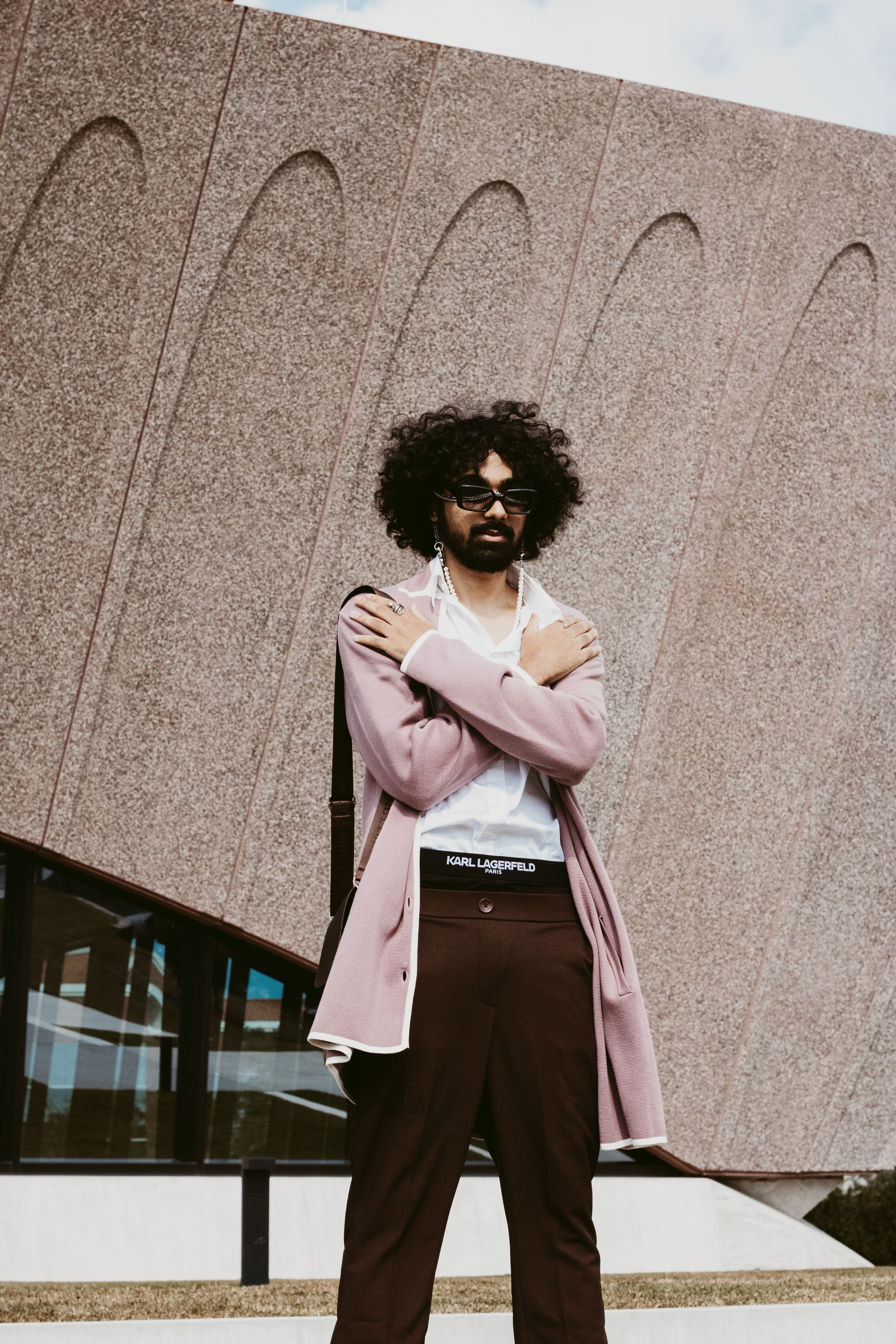 Man Posing with Arms Crossed · Free Stock Photo