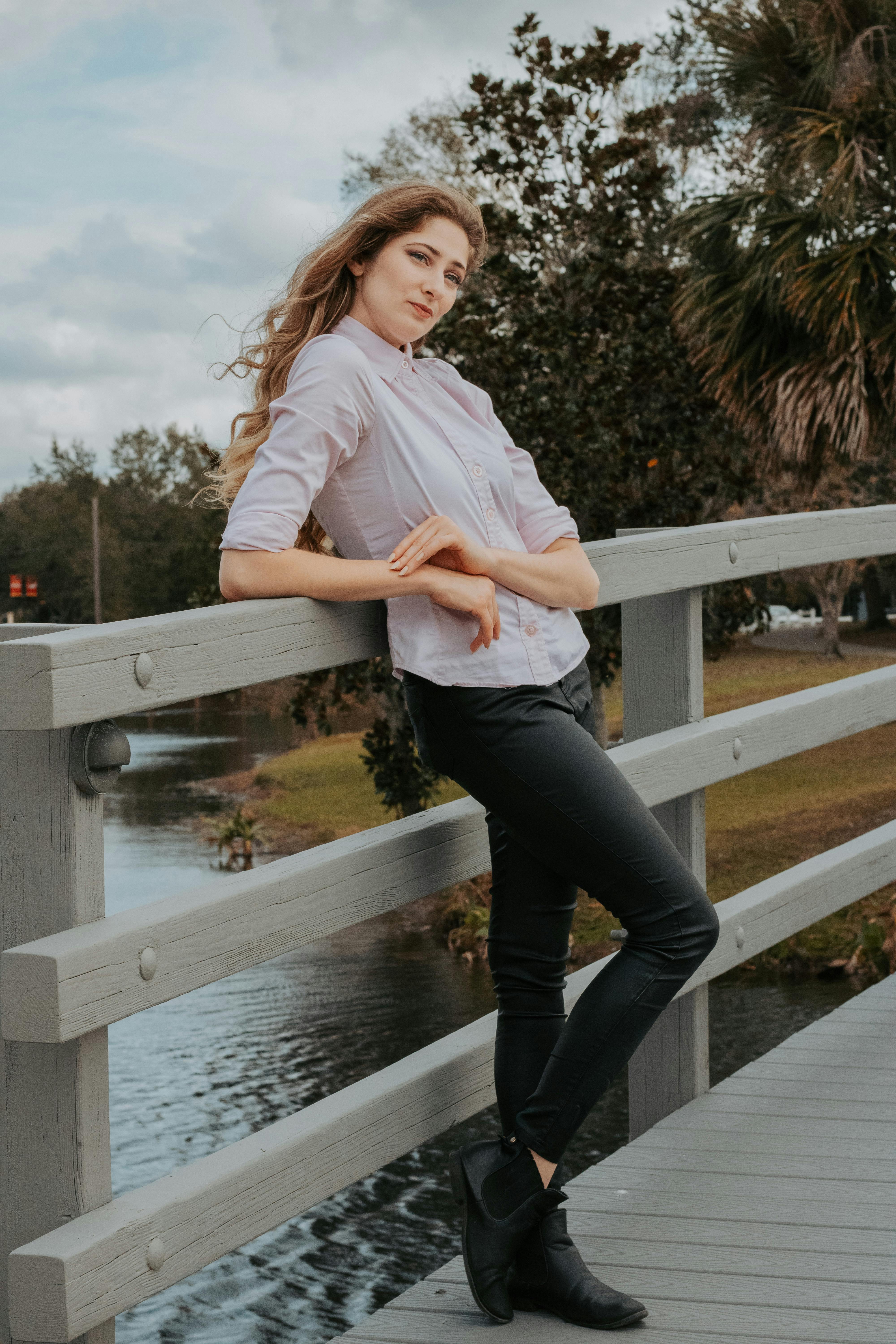 Woman Posing on Bridge · Free Stock Photo