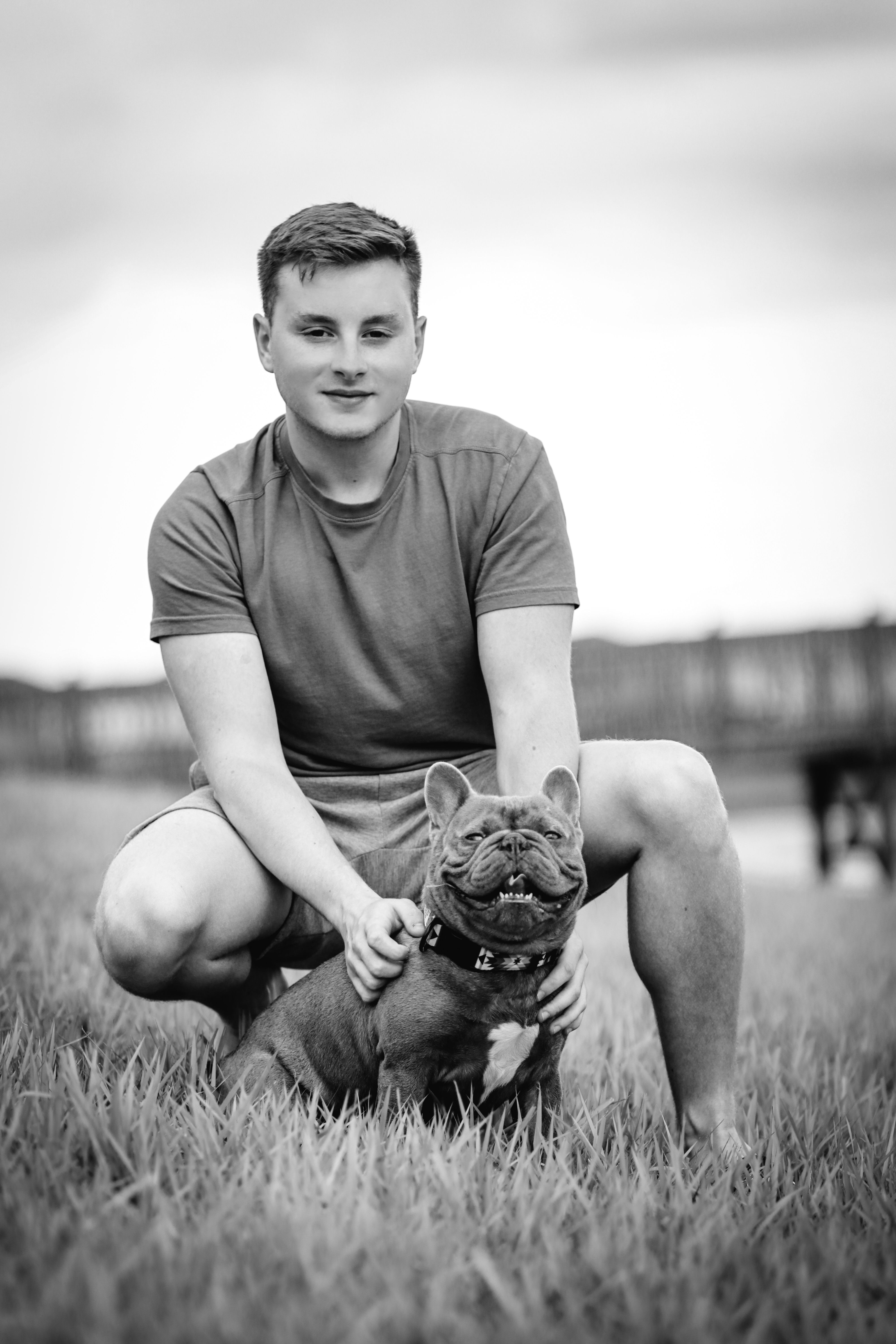 Man with Bulldog in Black and White · Free Stock Photo
